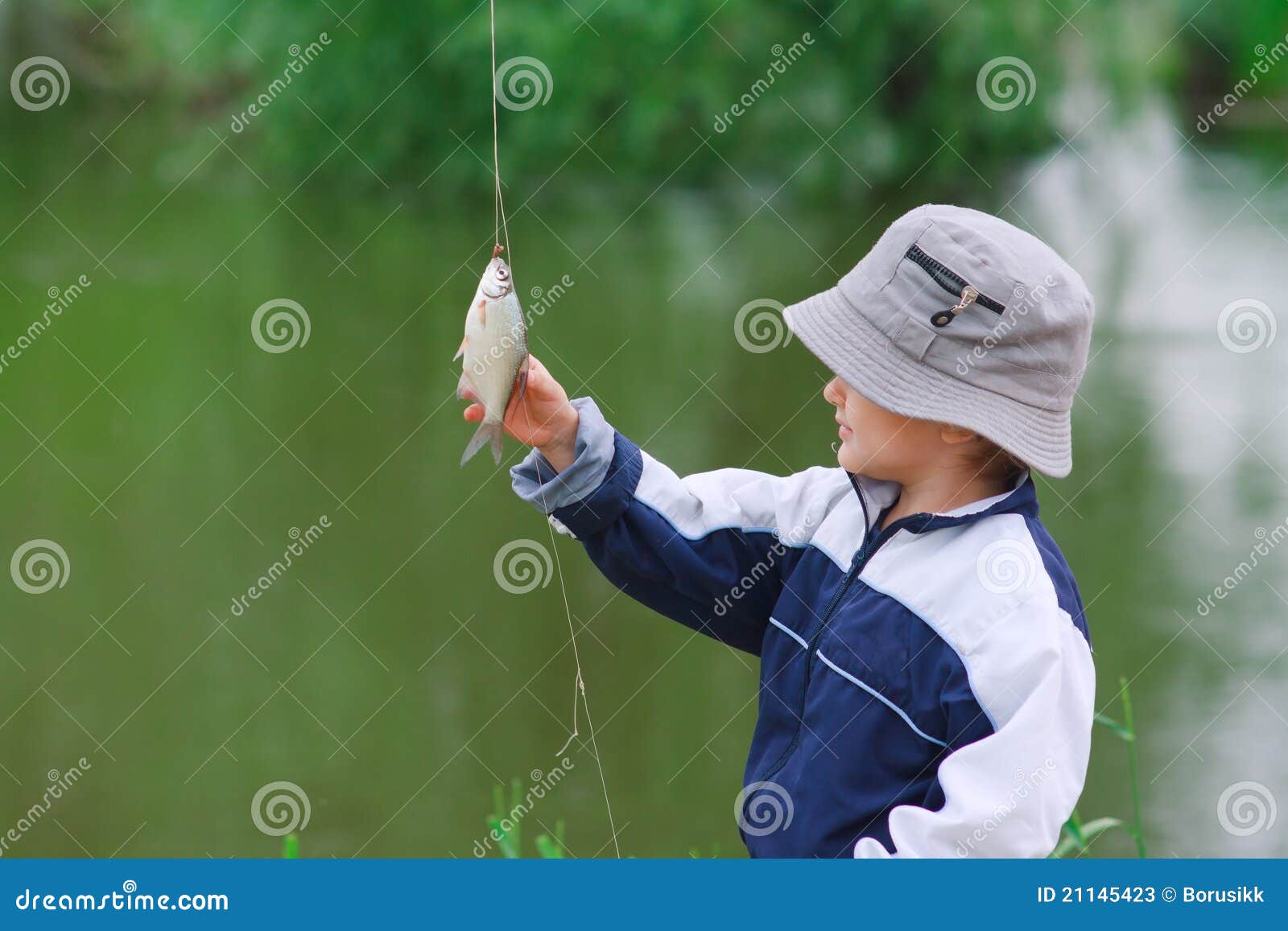 Little Boy Look at the Caught Fish Stock Image - Image of catch, river ...
