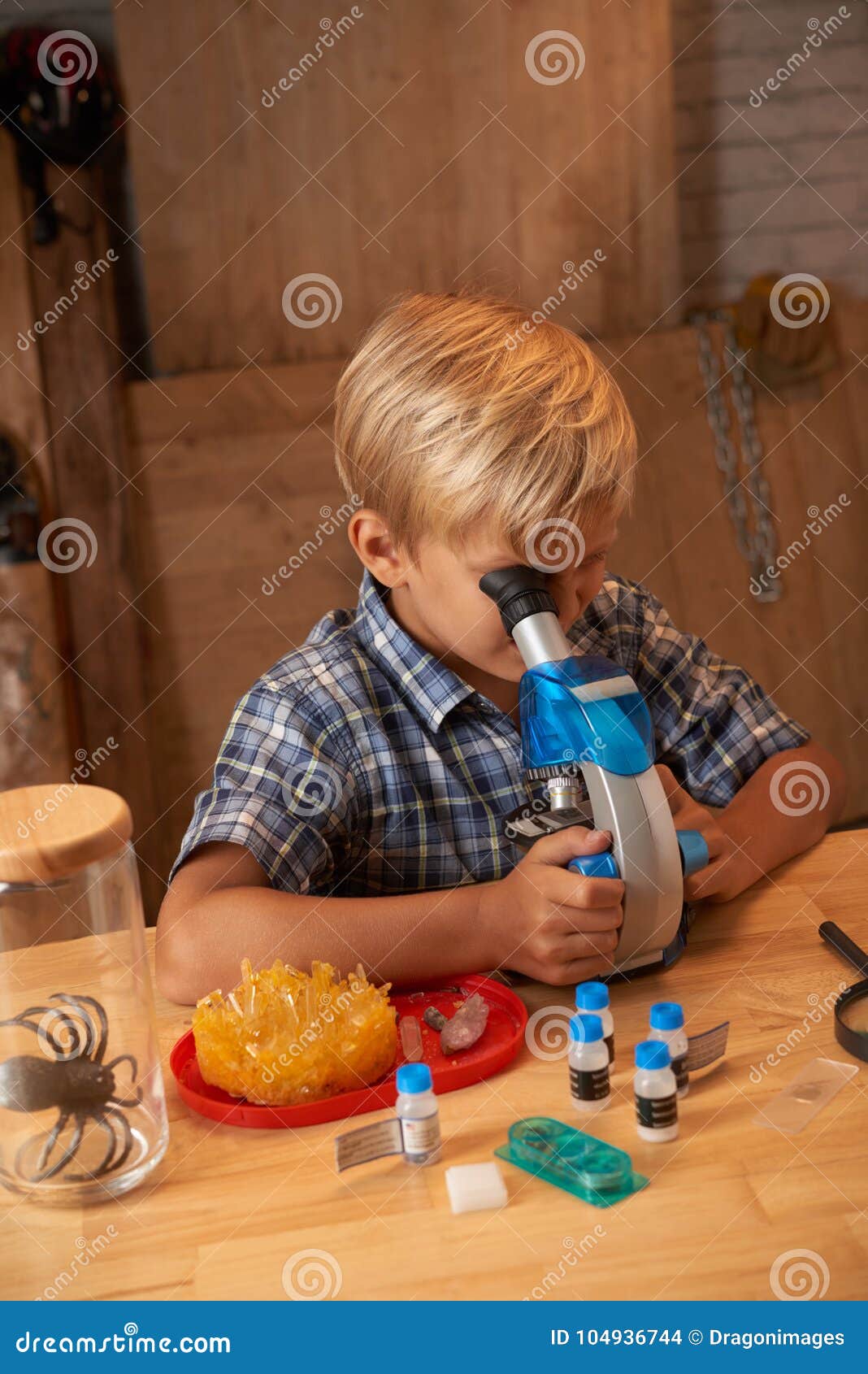 Examining crystals stock photo. Image of youngster, magnifier - 104936744