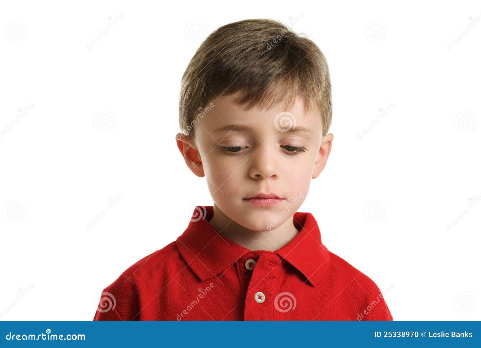 Little boy looking down stock photo. Image of studio - 25338970