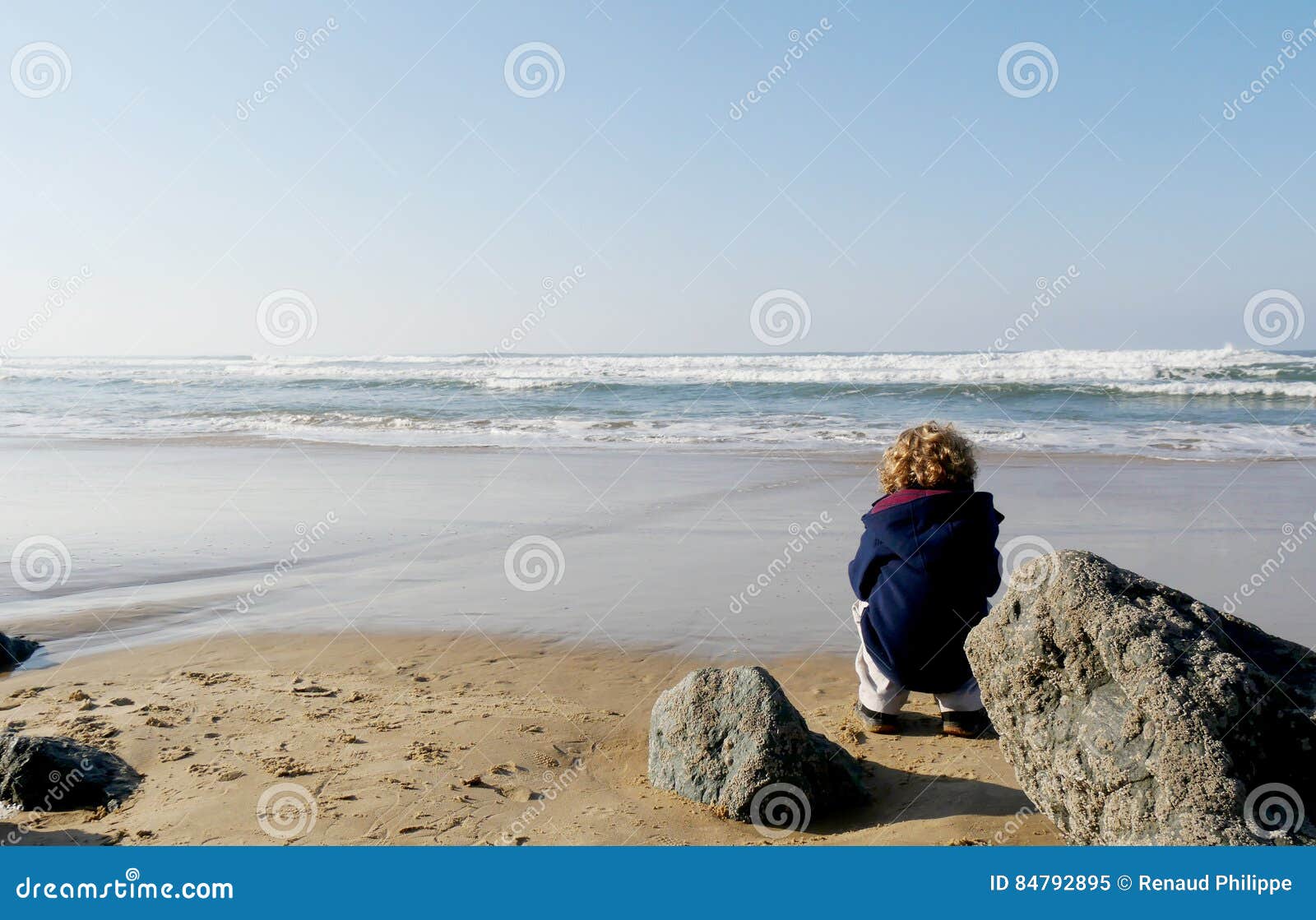 Little Boy Looking at the Ocean Stock Image - Image of happy, outdoors ...