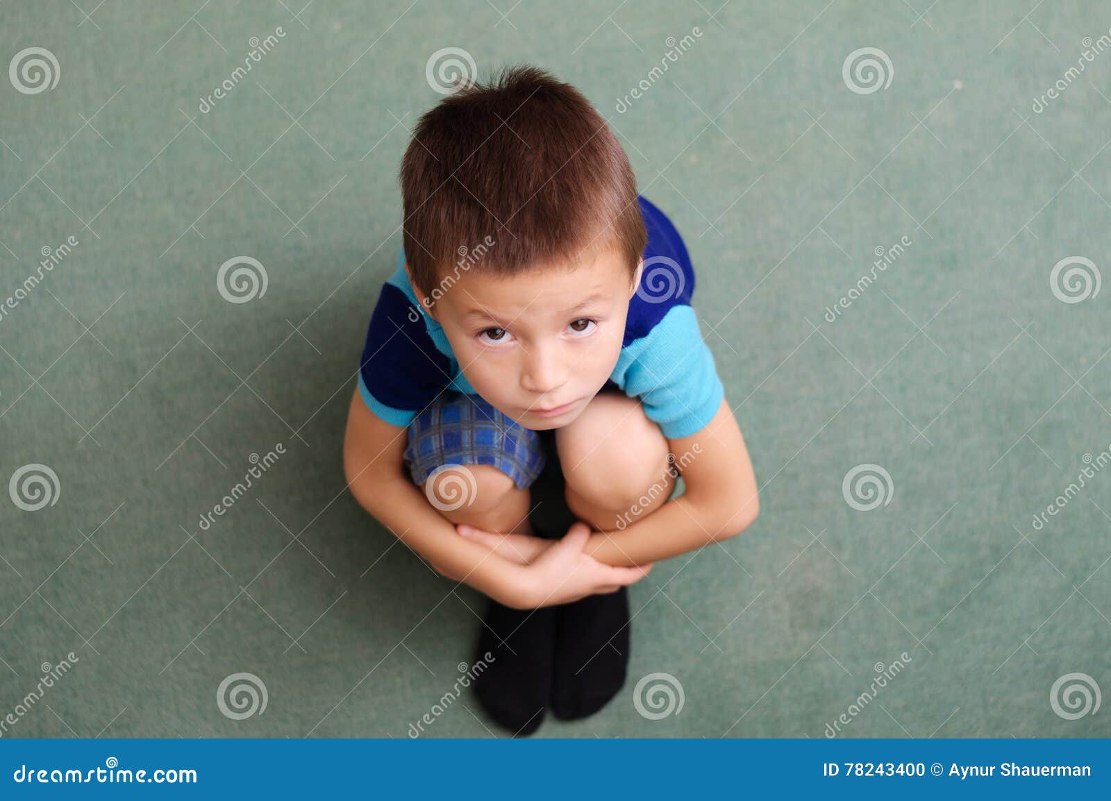 Little Boy Looking Up Sitting Folding Knees Stock Photo - Image of ...