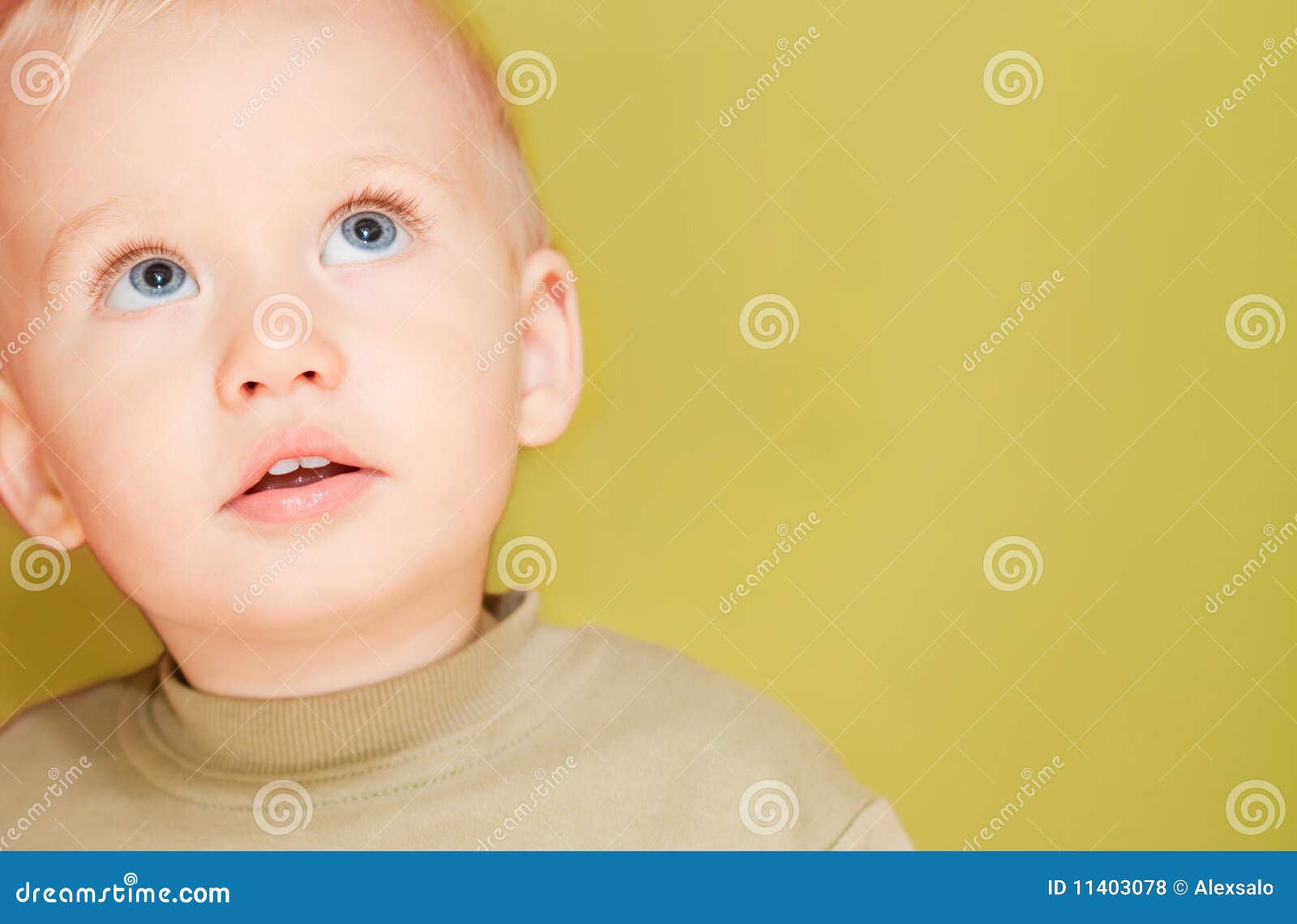 Little boy looking upward stock photo. Image of blond - 11403078