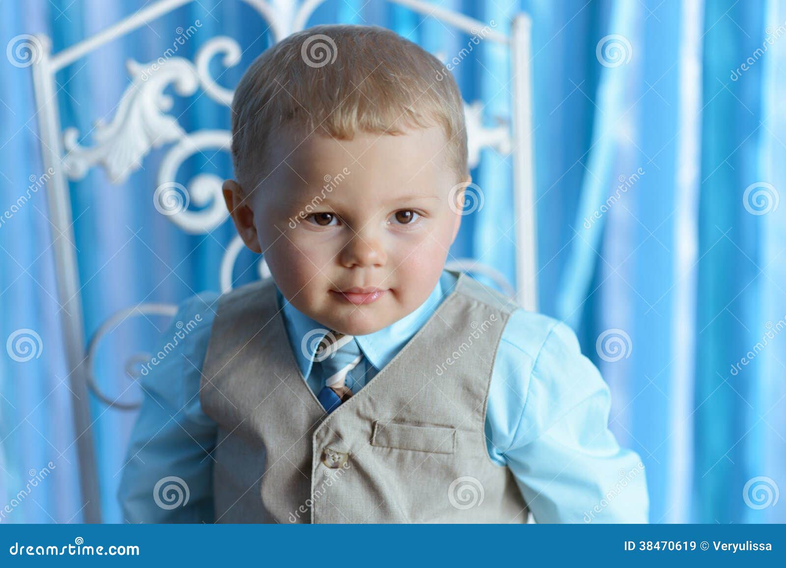Little boy looks seriously stock image. Image of hair - 38470619