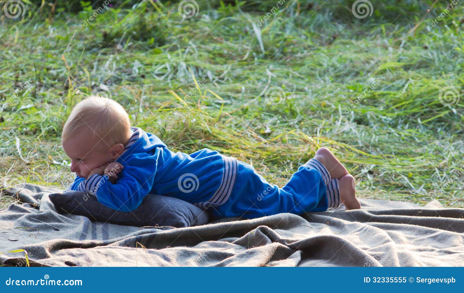 Little Boy Lying on Green Grass Stock Image - Image of beauty, outdoor ...