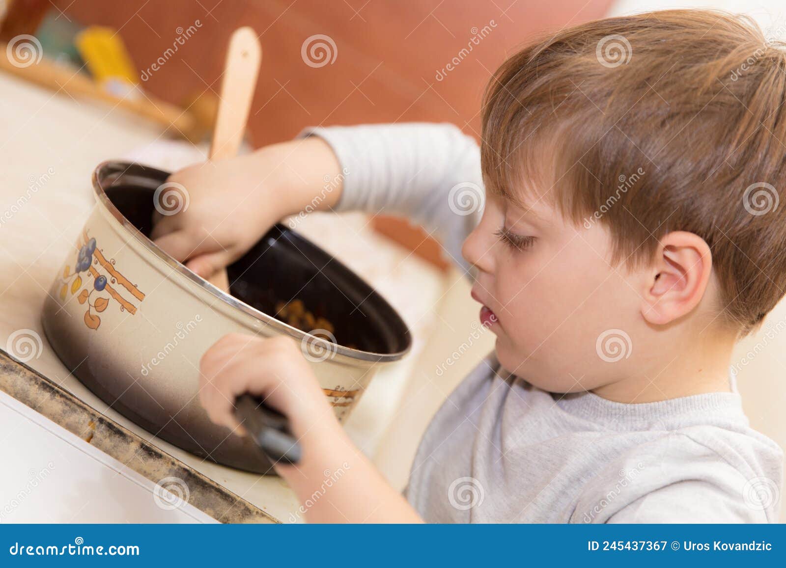 Little boy making cookies stock image. Image of working - 245437367