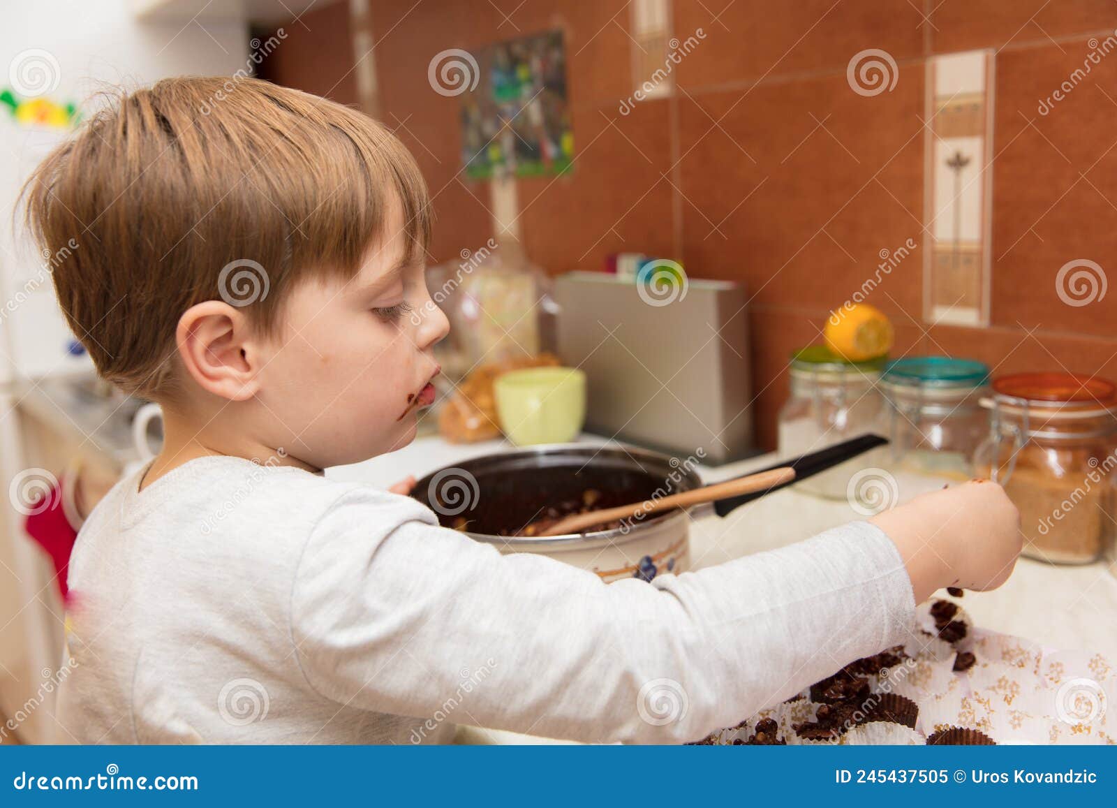 Little boy making cookies stock image. Image of cooking - 245437505