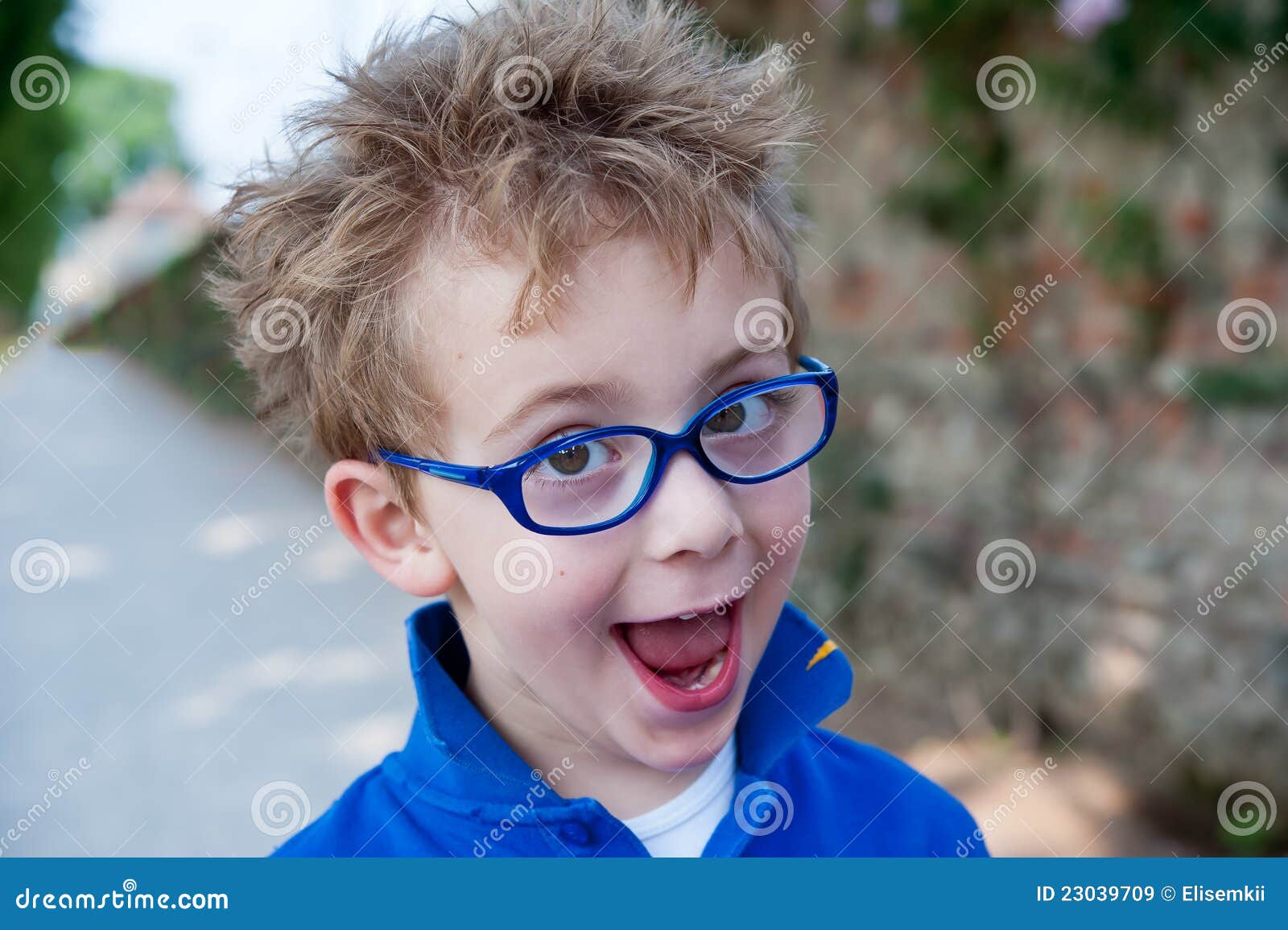 Little Boy Making Faces stock image. Image of focus, blond - 23039709