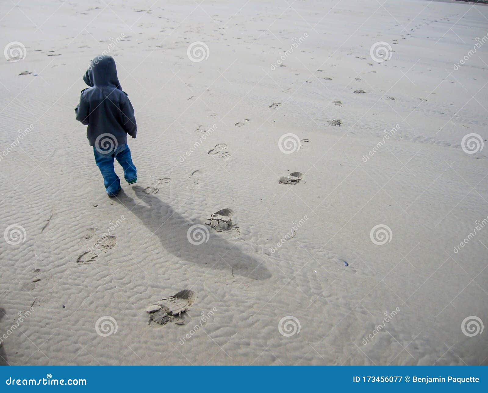 Little Boy Making Footprints in the Sand Stock Image - Image of water ...