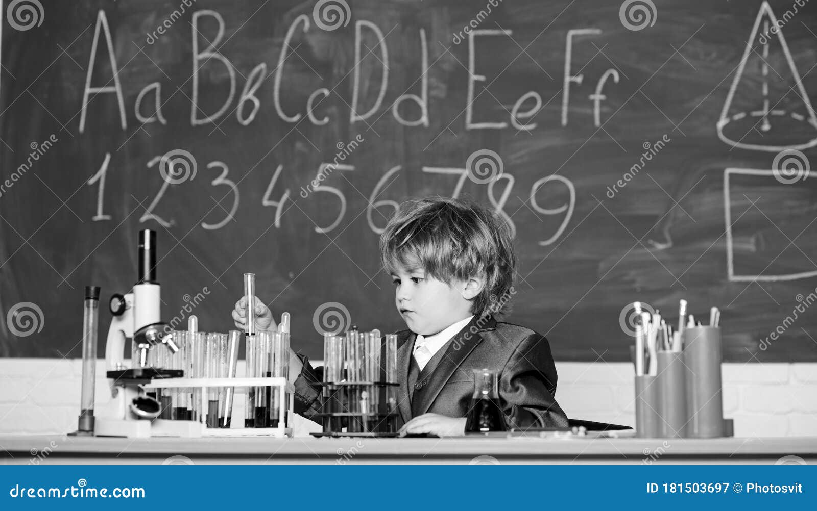 Little Boy is Making Science Experiments. Little Boy at Lesson. Back To ...