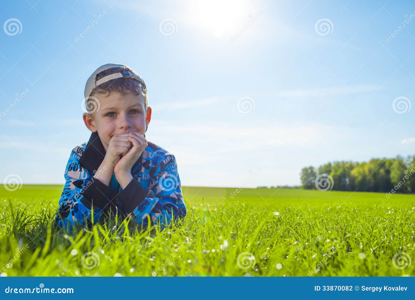 Little boy on meadow stock photo. Image of people, green - 33870082