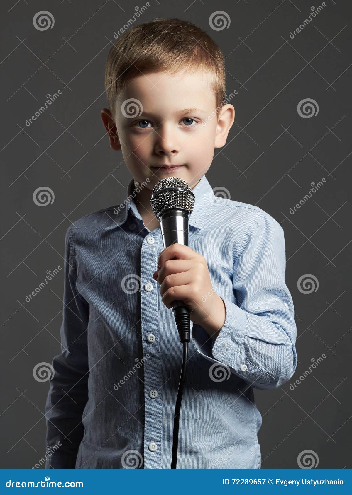 Little Boy with Microphone. Child Singing a Song Stock Image - Image of ...