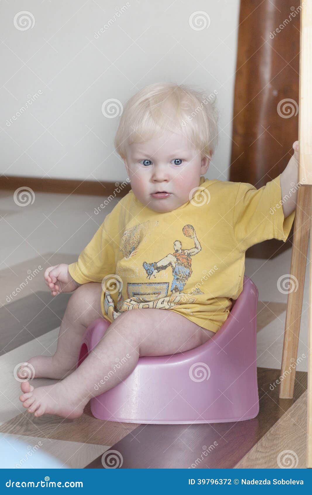 The Little Boy of 8 Months Sits on a Pot Stock Photo - Image of hand ...