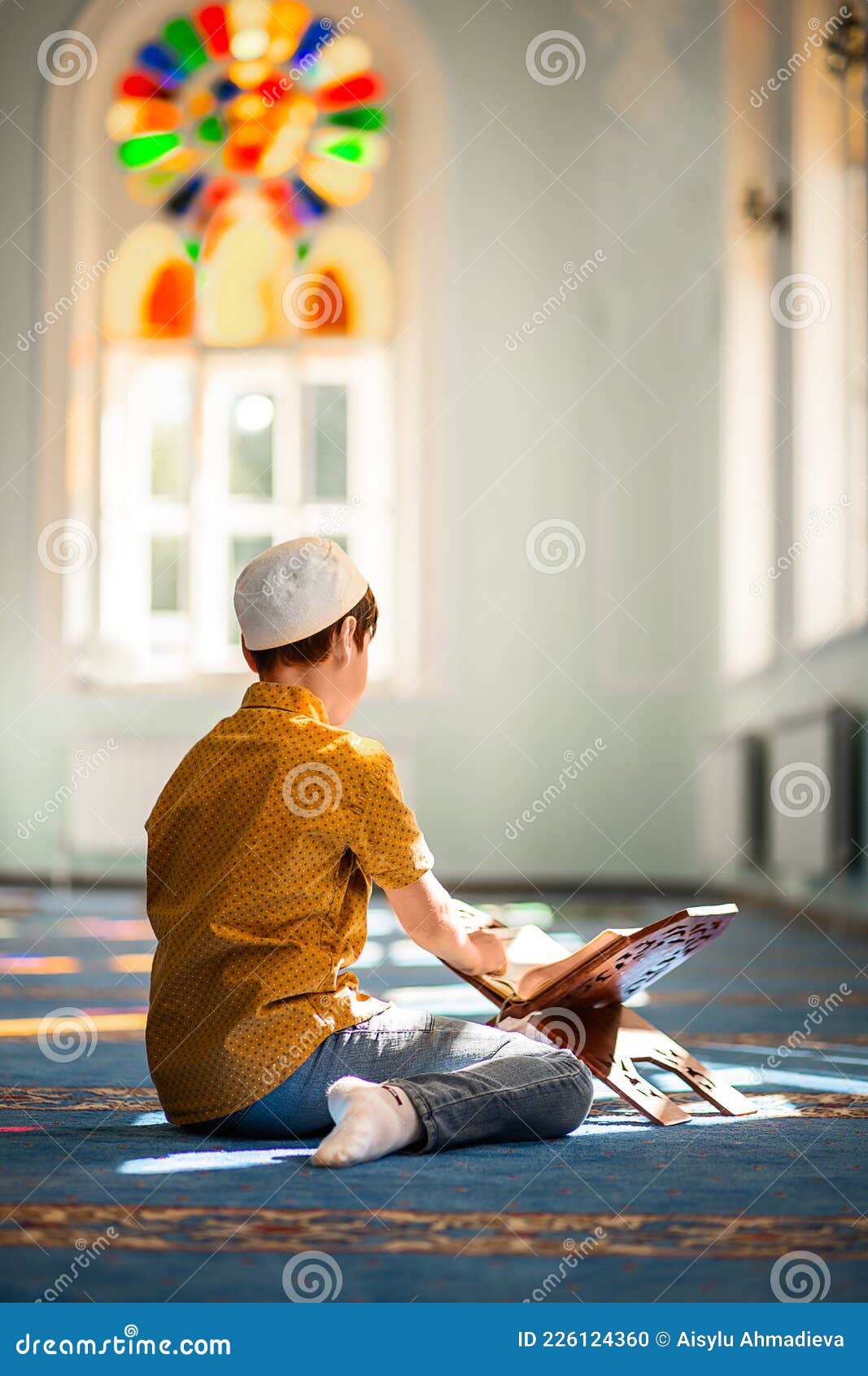 Little Boy in the Mosque Read the Quran. Stock Photo - Image of muslim ...
