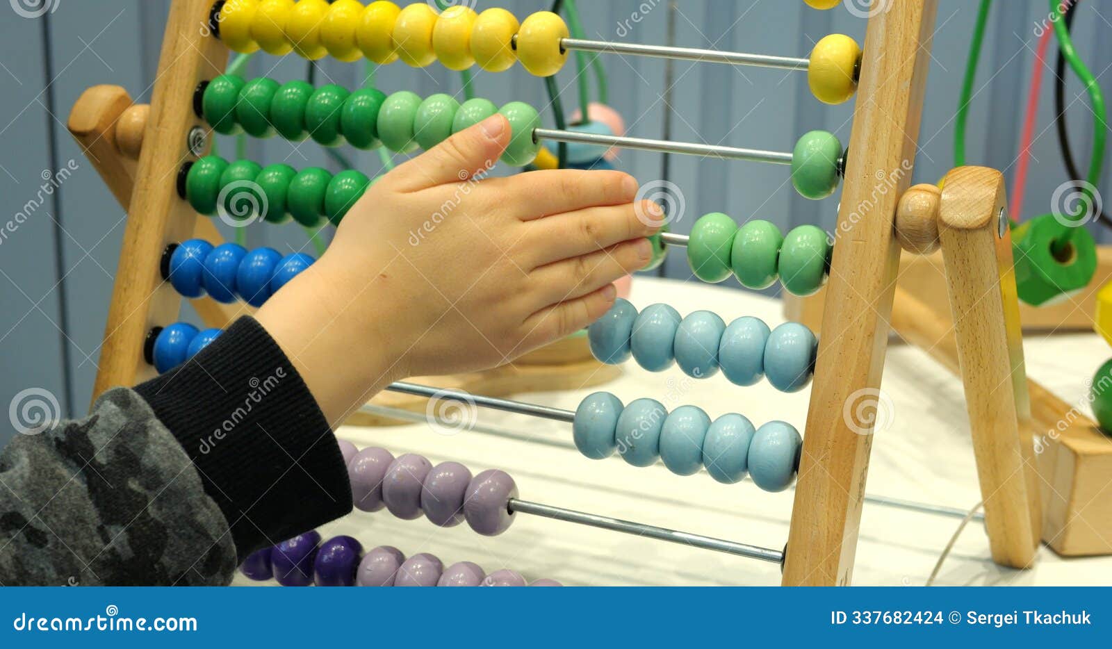 Little Boy Moves Adding Numbers Using Abacus in Kindergarten Classroom ...