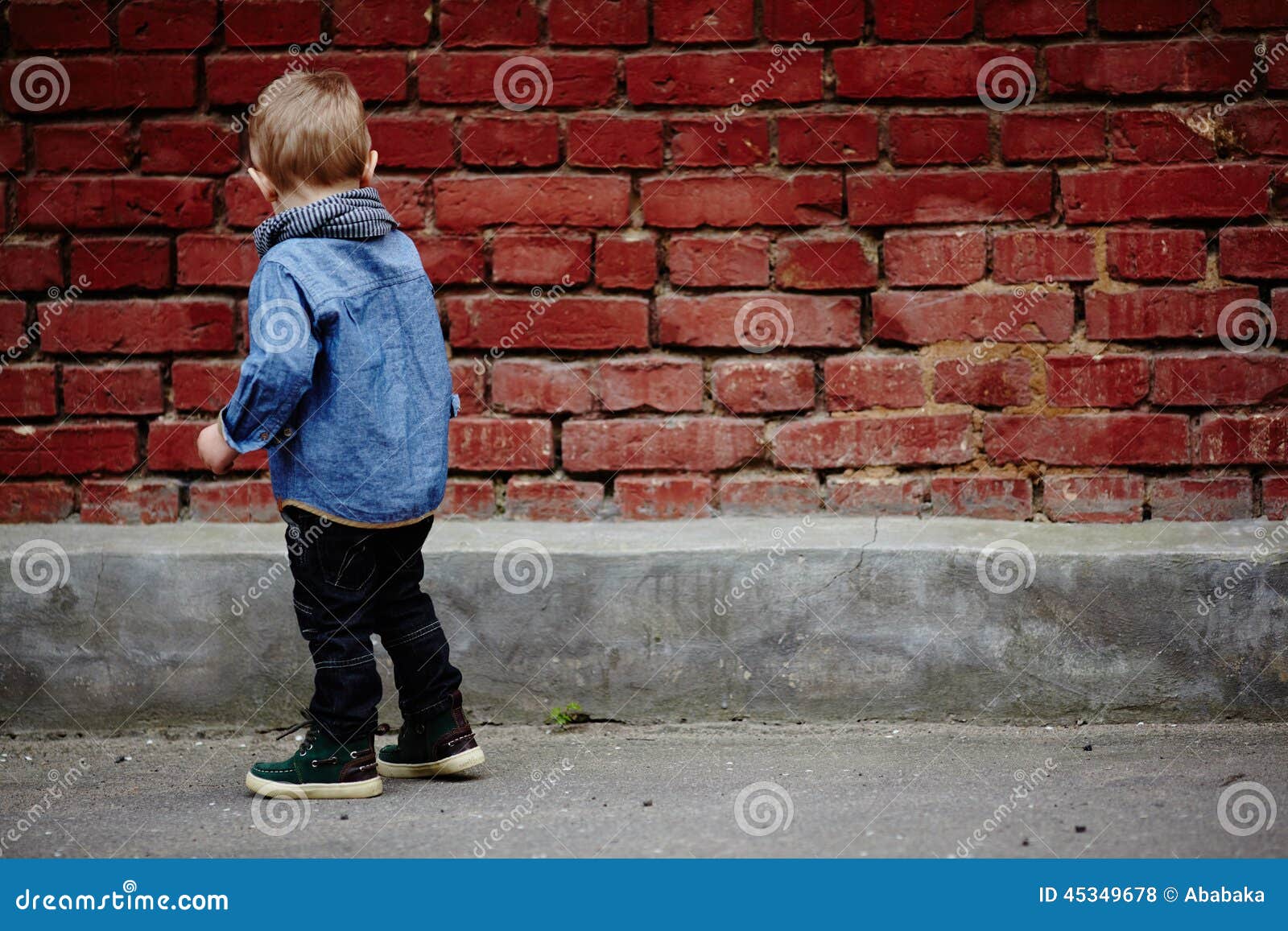 Little Boy Near Red Brick Wall Stock Photo - Image of marching, child ...