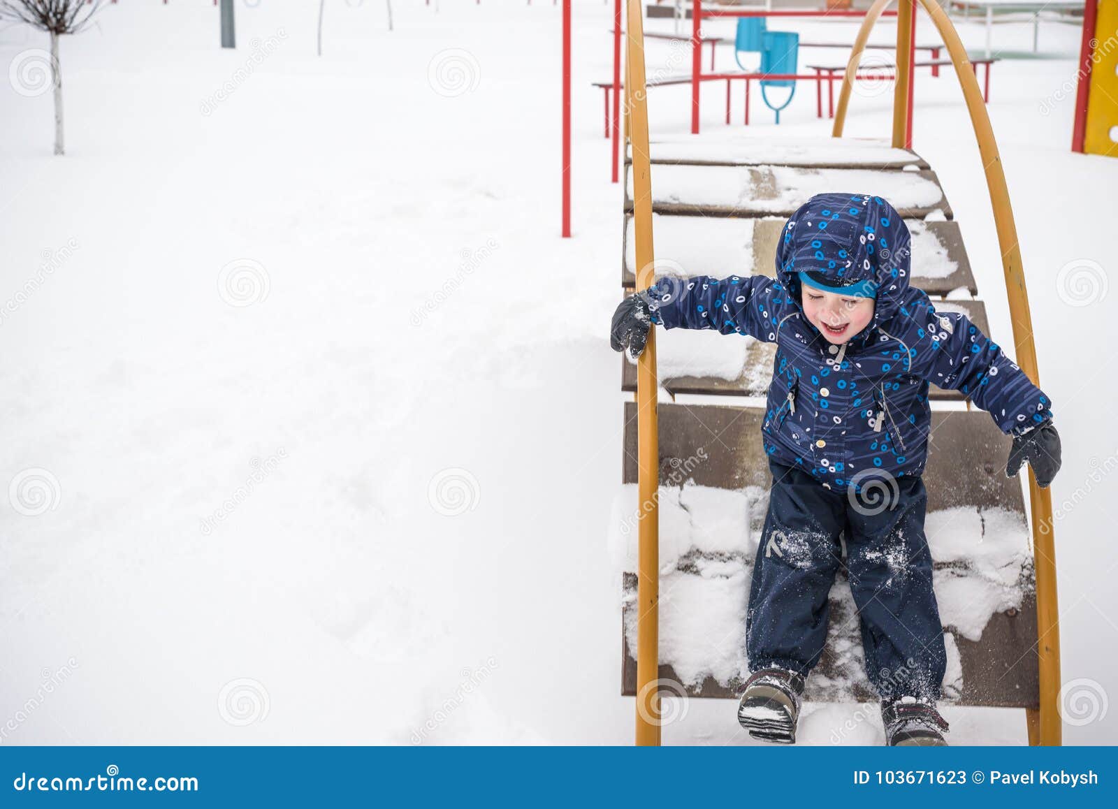 Little Boy Outdoors in Cold Winter Snow. Playground Stock Image - Image ...