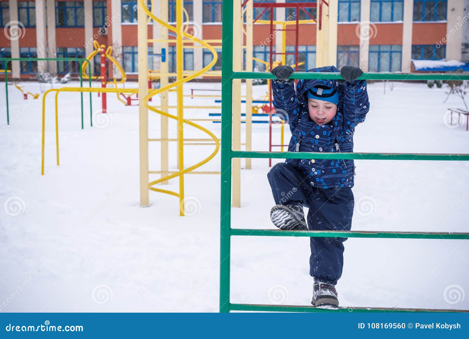 Little Boy Outdoors in Cold Winter Snow. Playground Stock Photo - Image ...