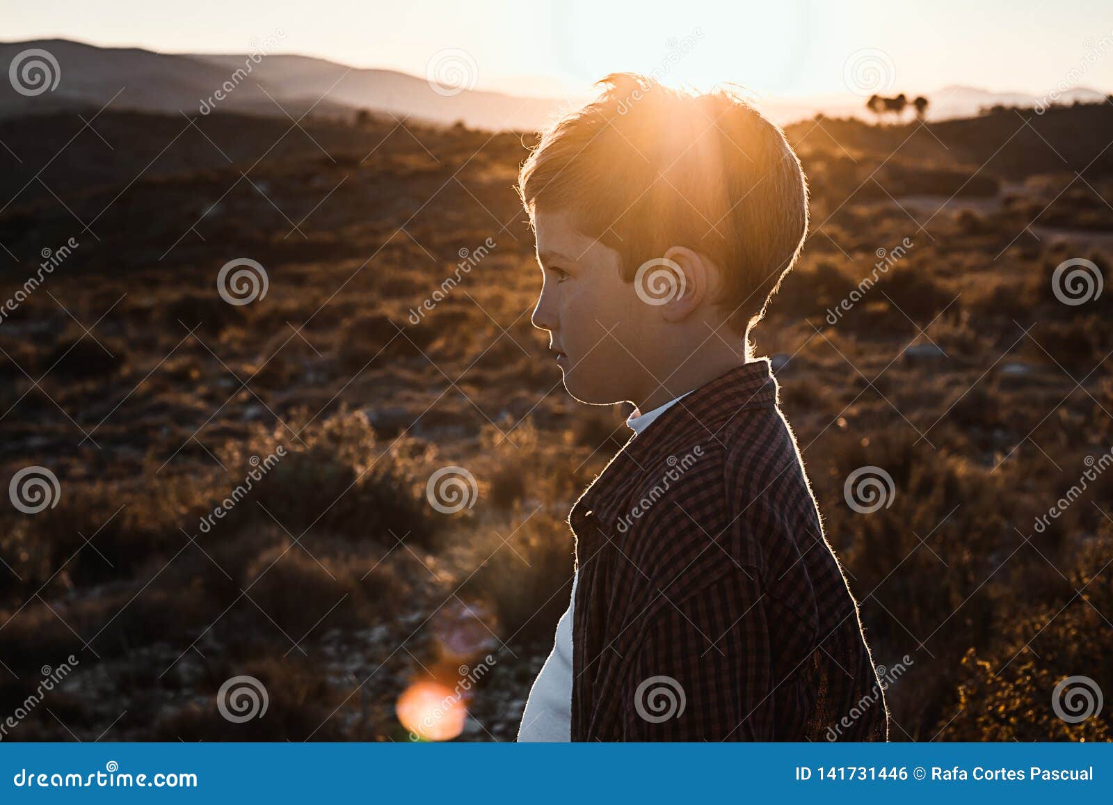 Little Boy Outdoors Looking at the Camera with Serious Expression. Kid ...