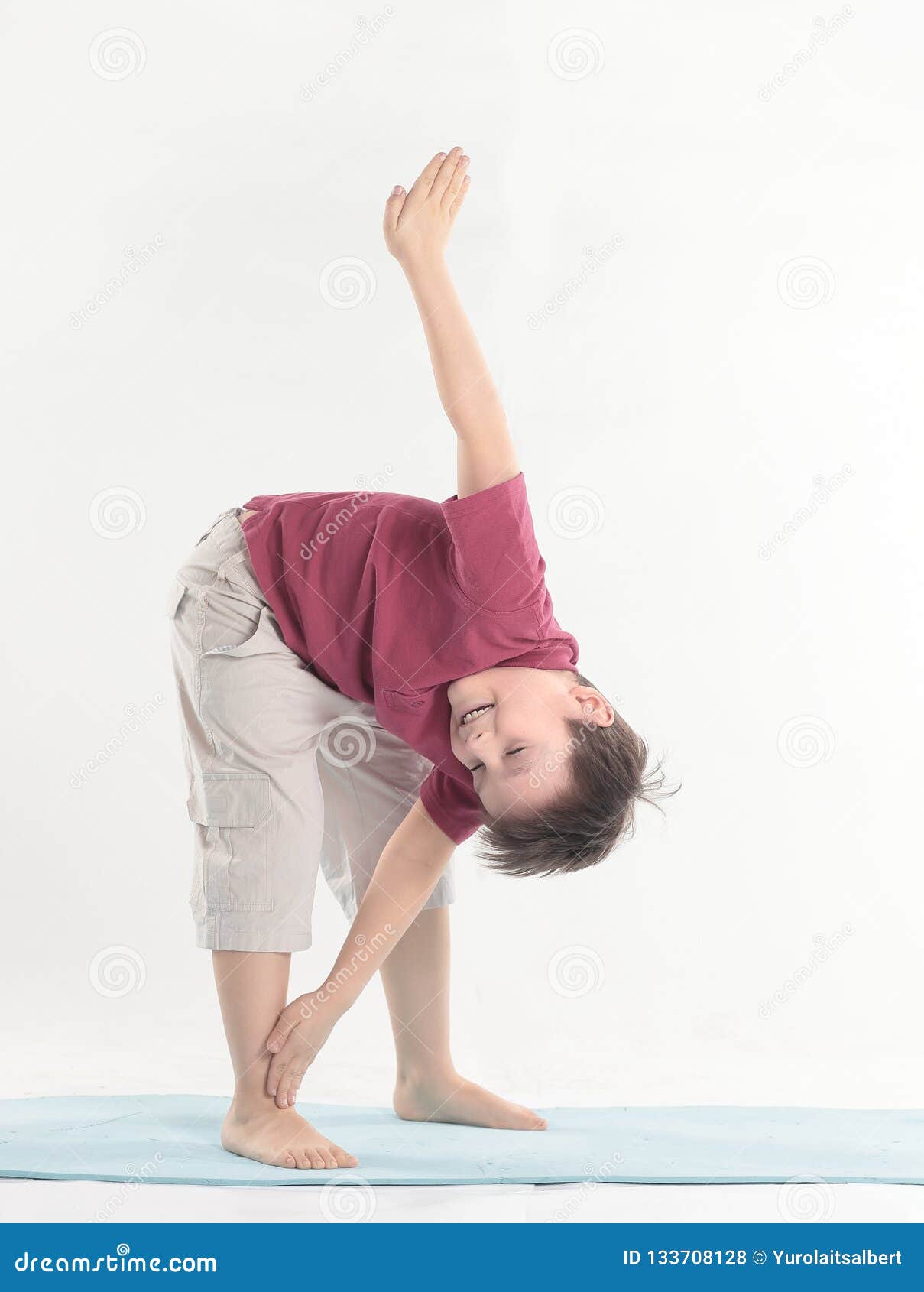 Little Boy Performs an Exercise To Stretch the Muscles.isolated on ...