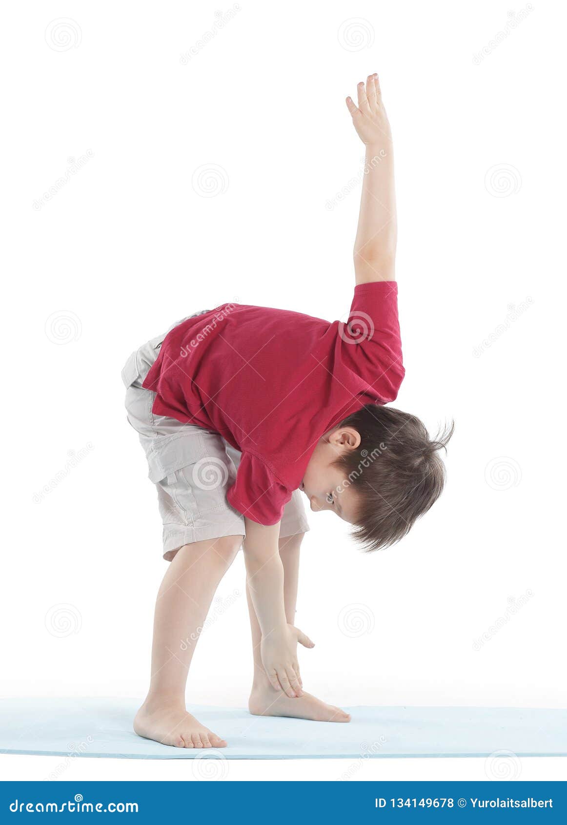 Little Boy Performs an Exercise To Stretch the Muscles.isolated on ...