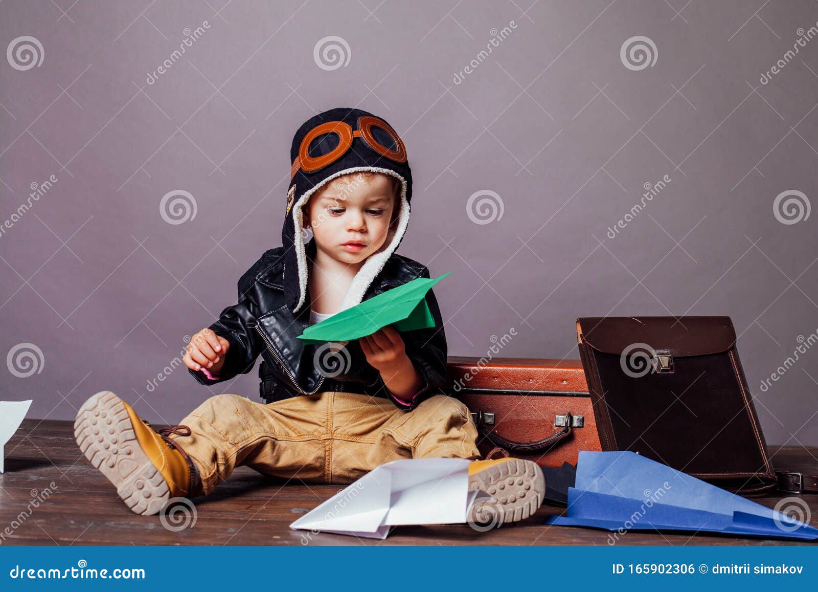 Little Boy Pilot Plays in the Paper Plane Stock Photo - Image of future ...