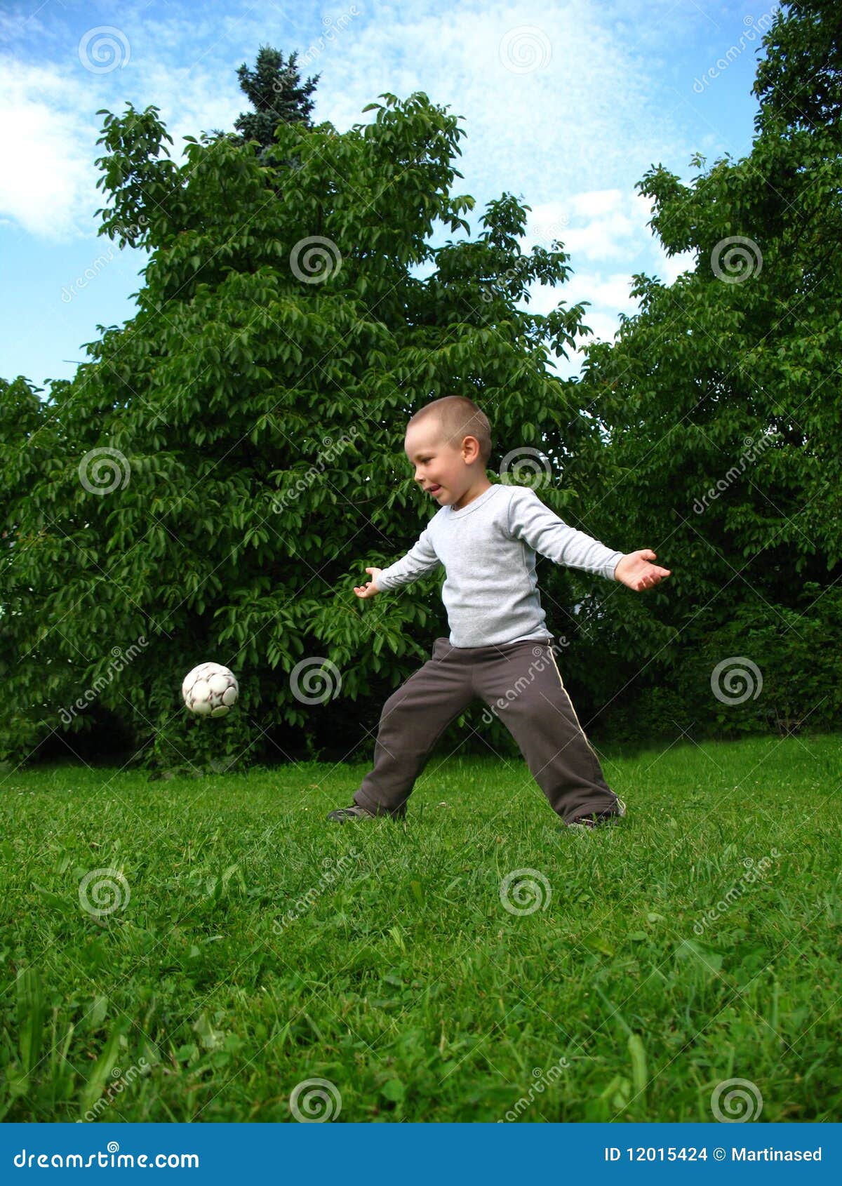 Little boy play football stock photo. Image of park, activity - 12015424