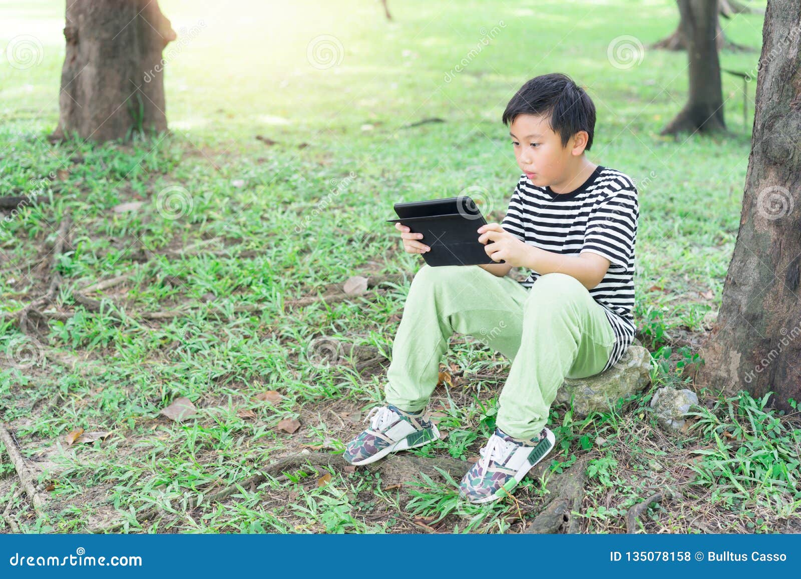 Little Boy Play Game on Tablet Stock Photo - Image of learning, adult ...