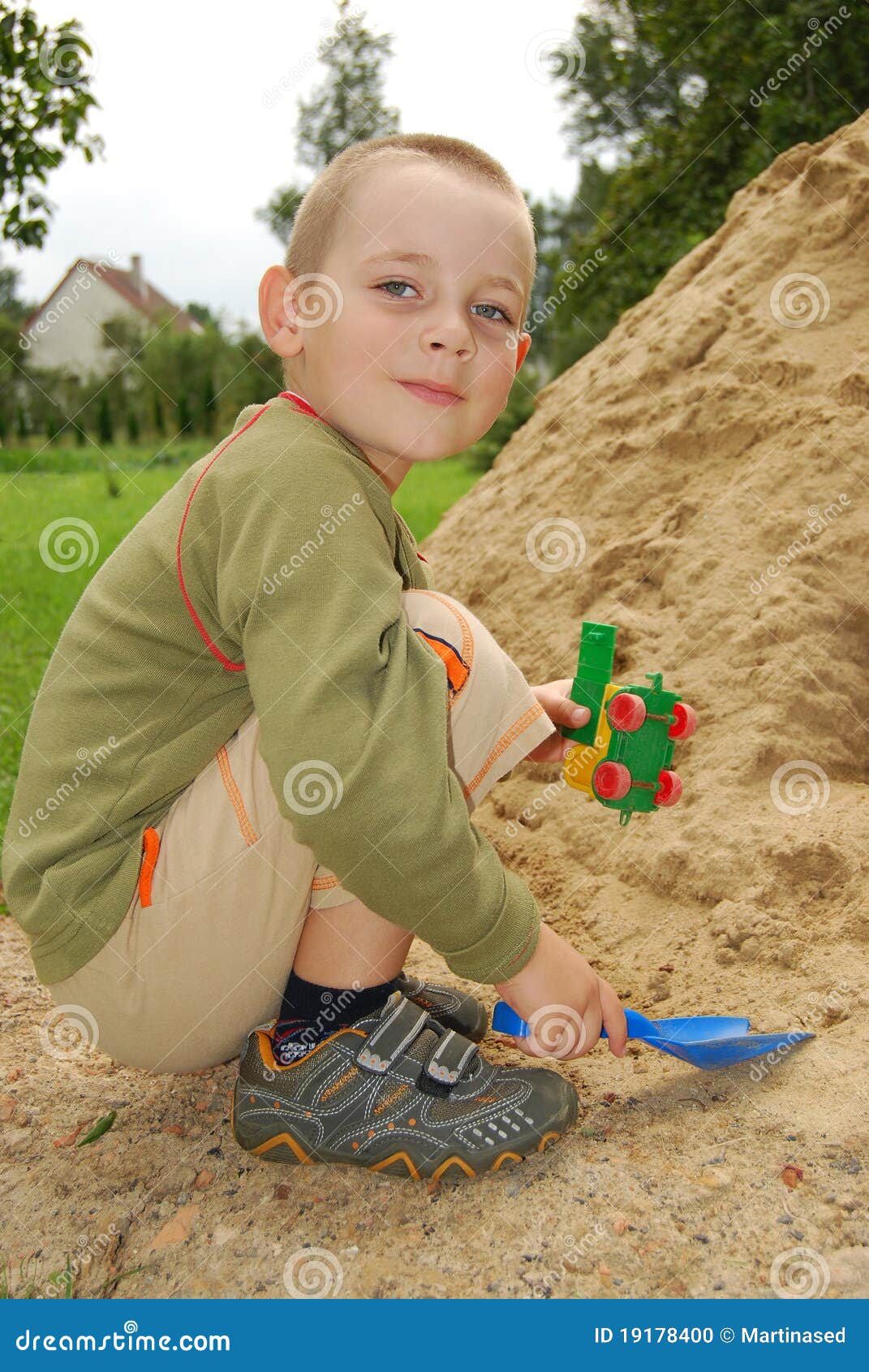 Little boy play with sand stock photo. Image of tripod - 19178400