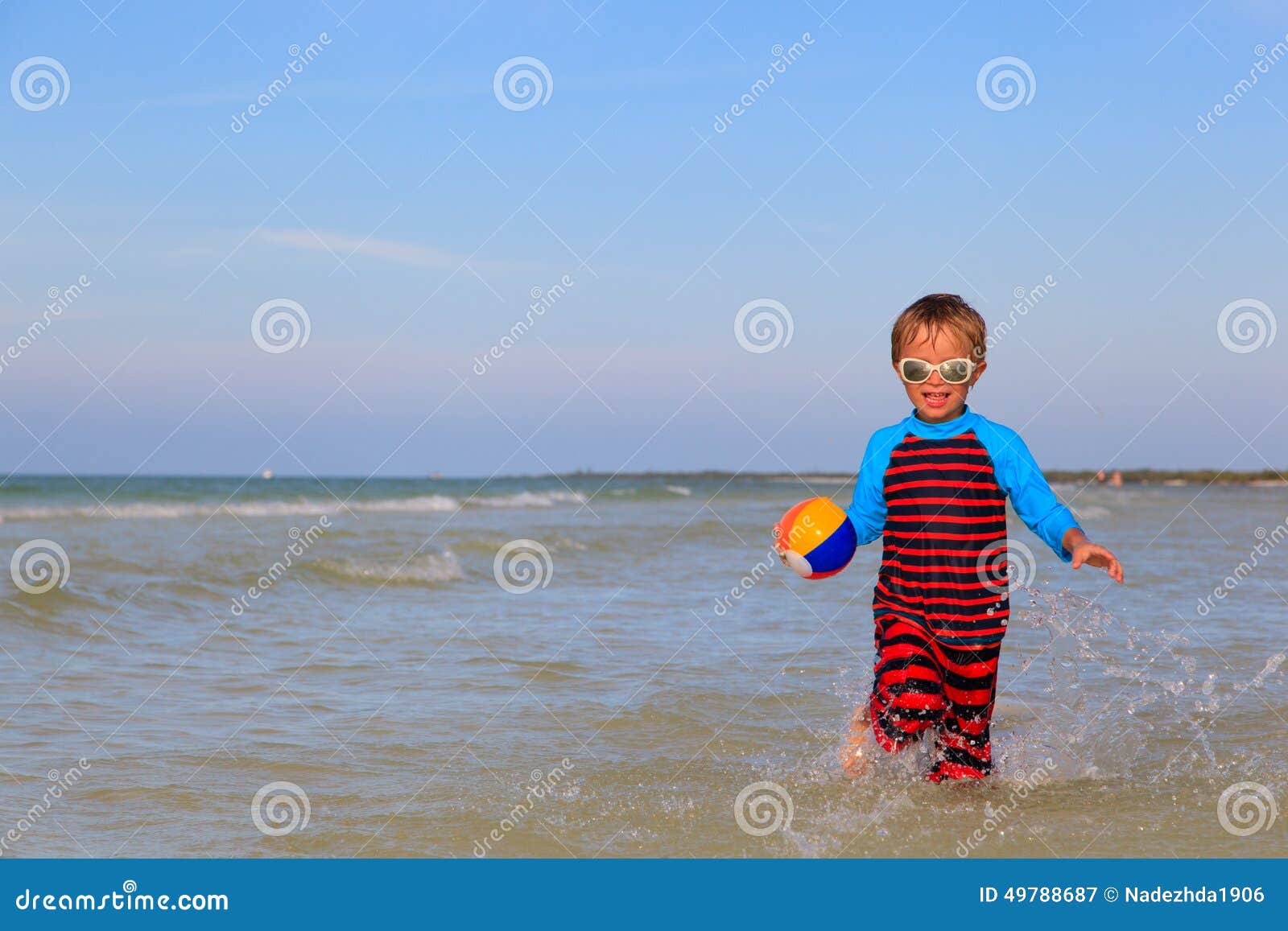 Little Boy Playing Ball on the Beach Stock Image - Image of blond, game ...