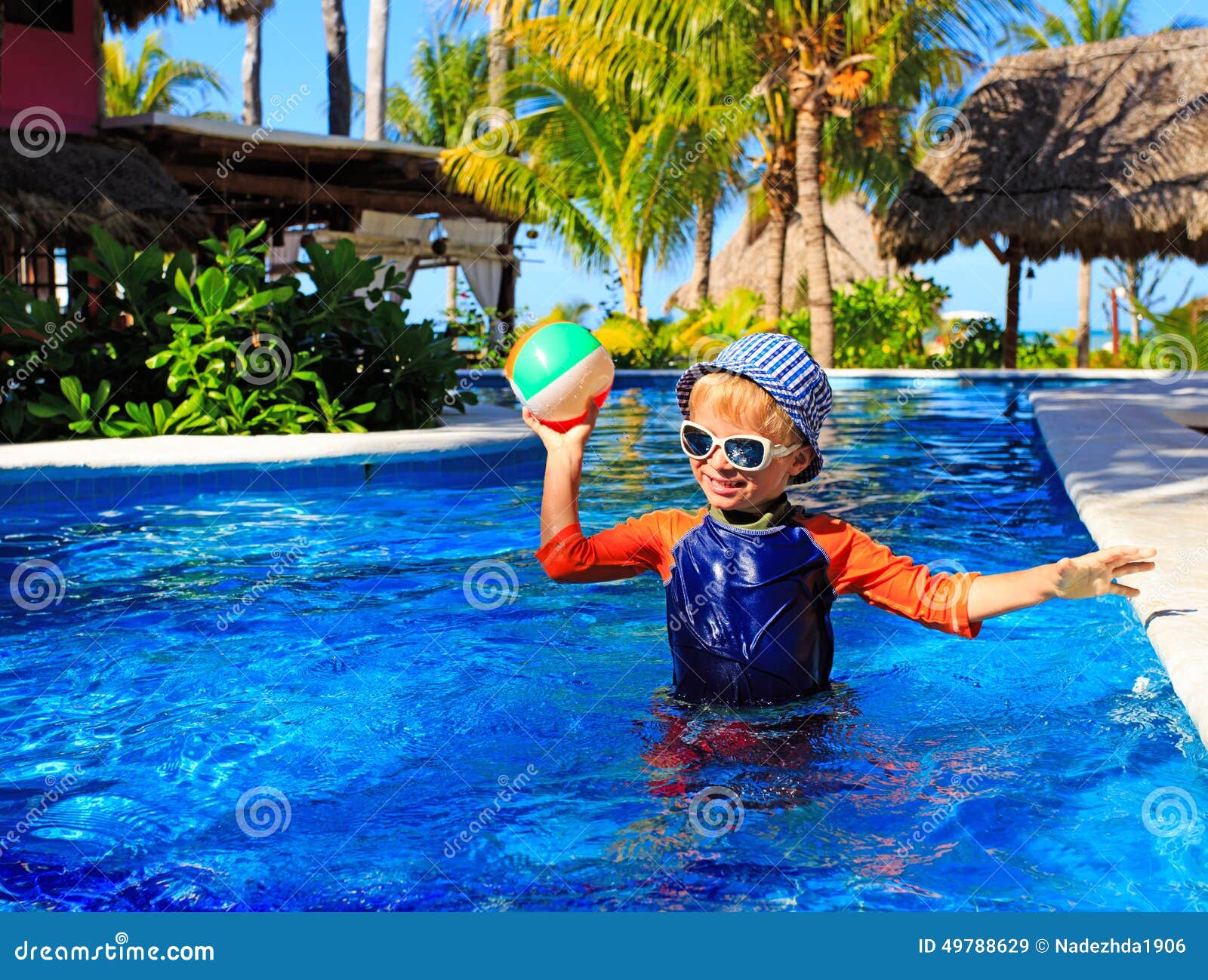 Little Boy Playing Ball in Swimming Pool on Beach Stock Image - Image ...