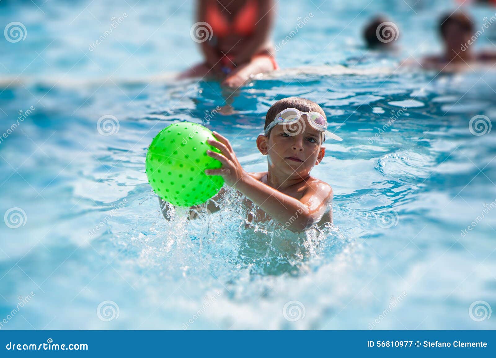 Little Boy Playing with Ball in a Swimming Pool Stock Image - Image of ...