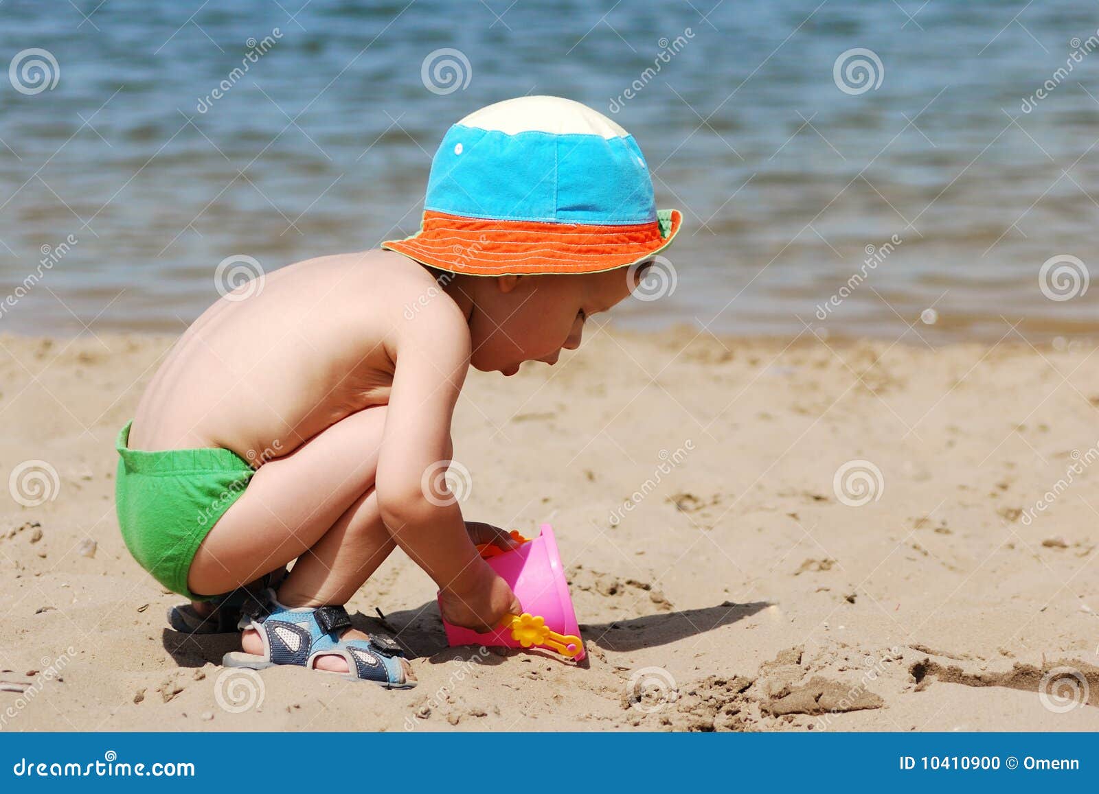 Little Boy Playing on the Beach Stock Photo - Image of beautiful, face ...