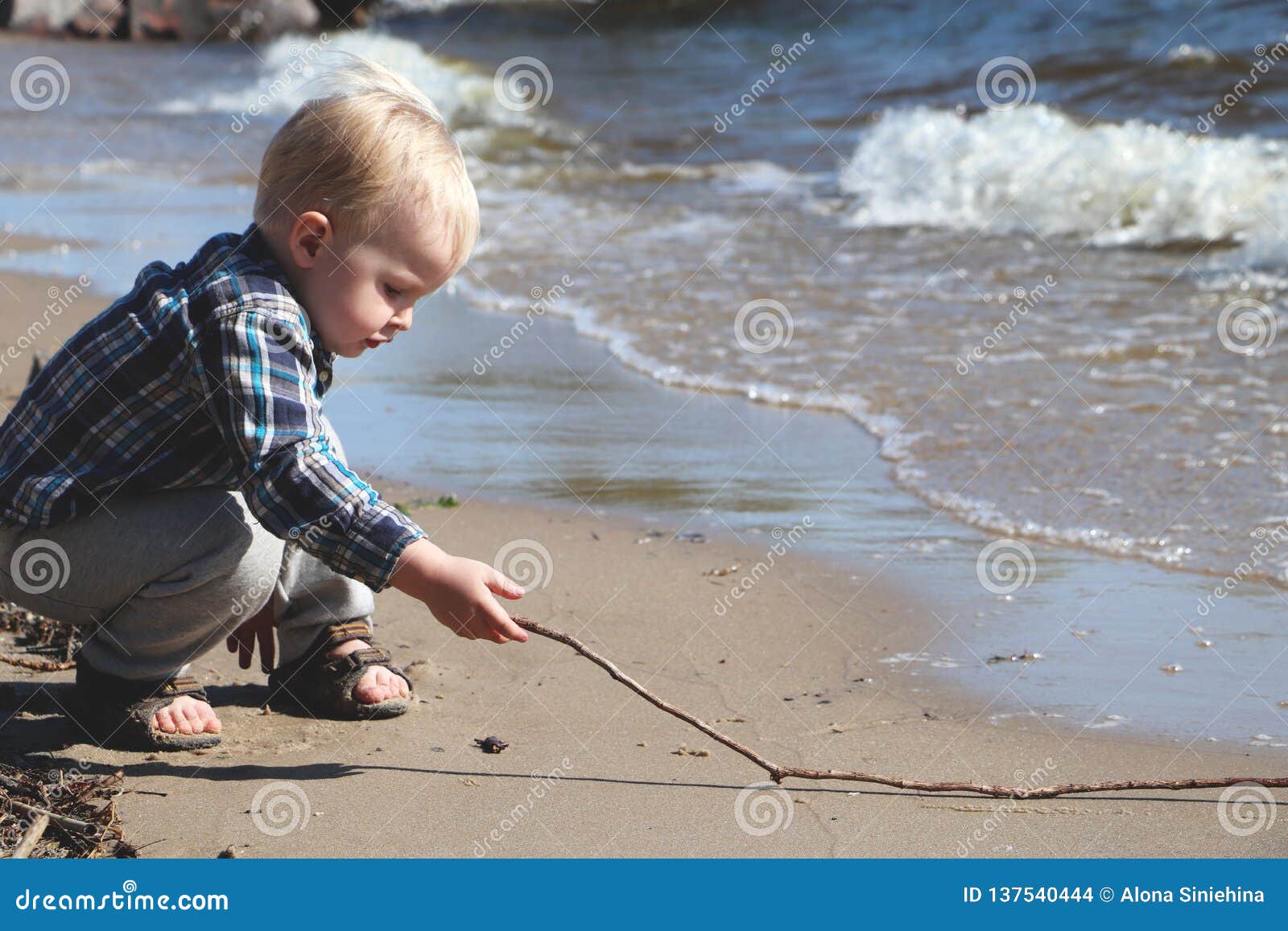 Little Boy Playing on the Beach Stock Photo - Image of playing ...