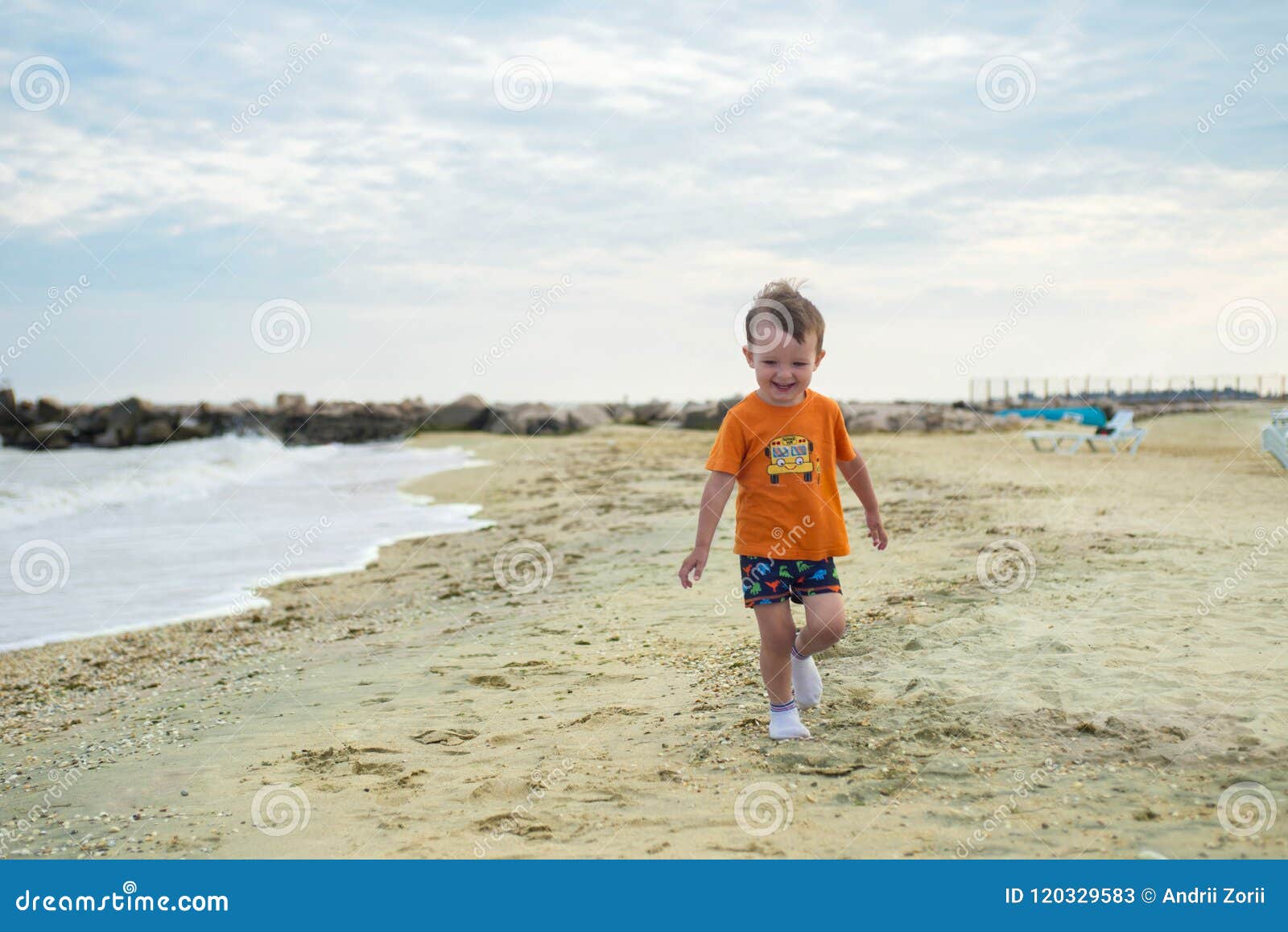 Little Boy Playing on the Beach. Stock Image - Image of childhood ...