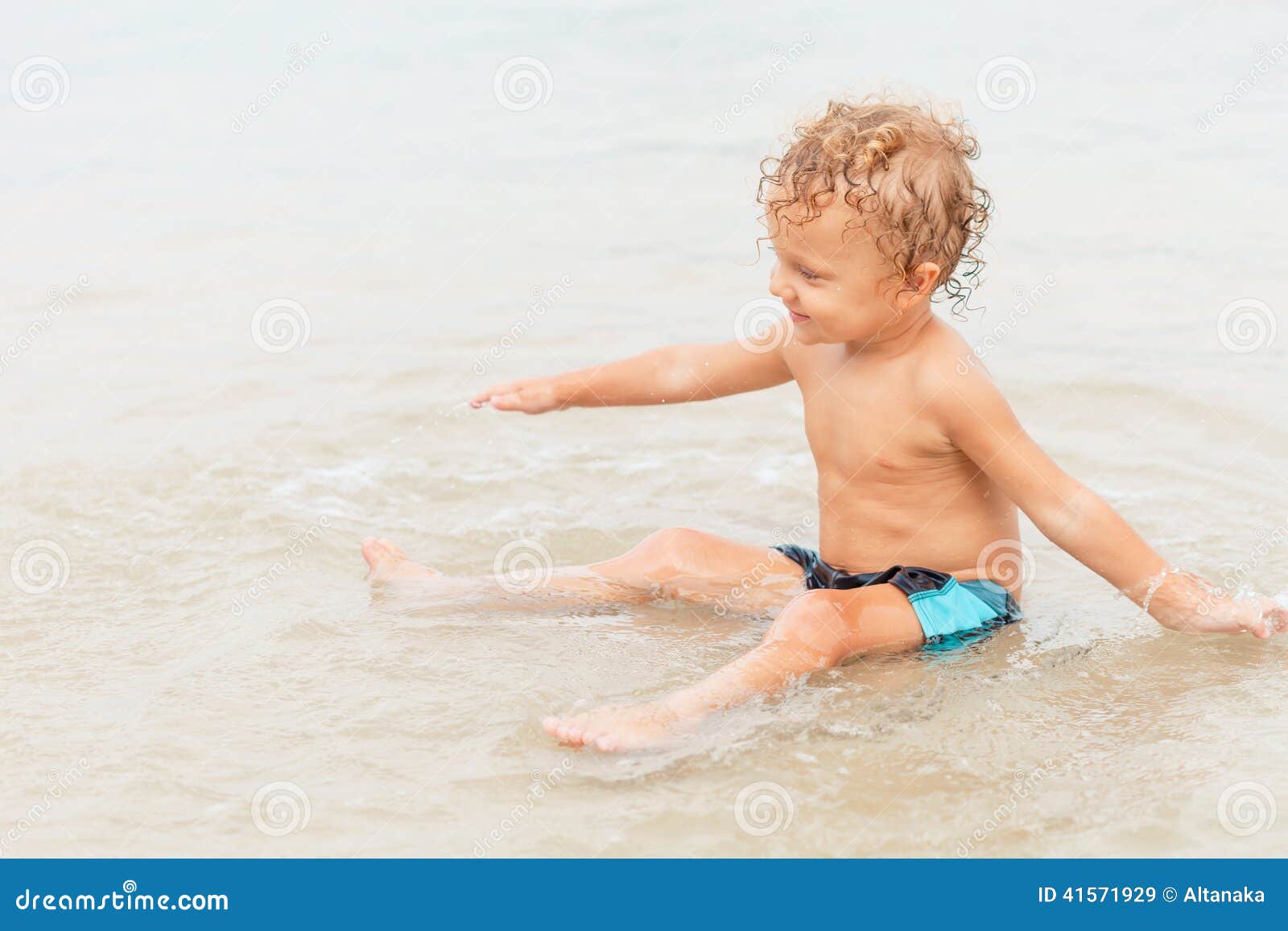 Little Boy Playing on the Beach. Stock Image - Image of child, playing ...