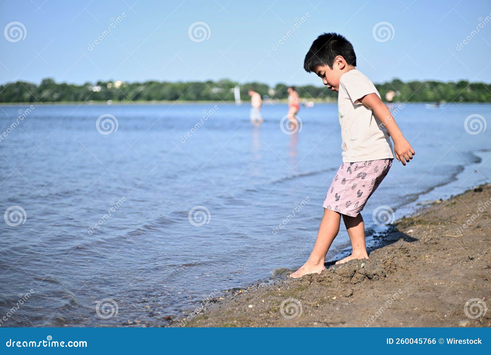 Little Boy Playing on a Beach of a Lake Stock Photo - Image of happy ...