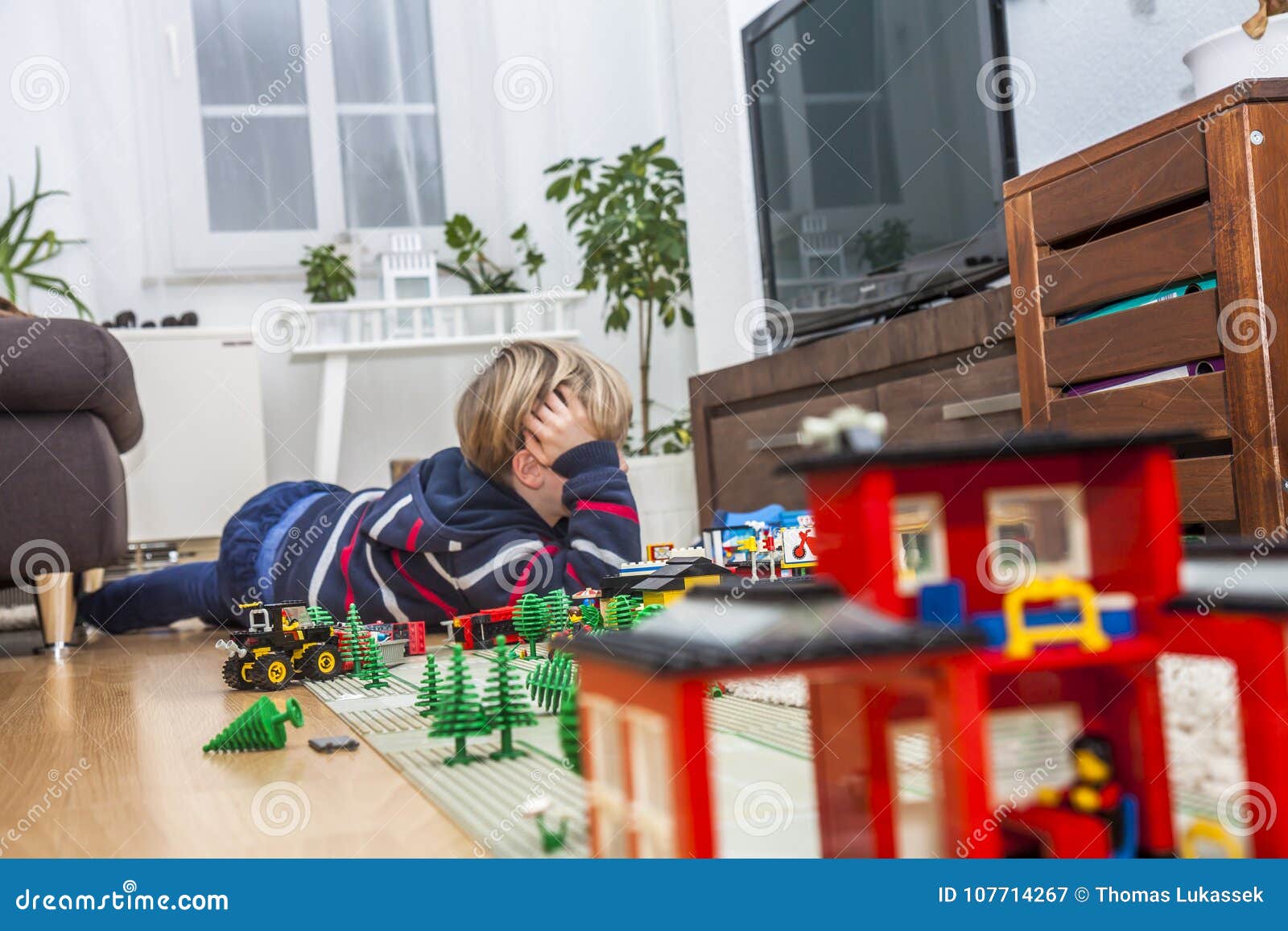 Little Boy Playing with Bricks on the Floor Stock Image - Image of ...