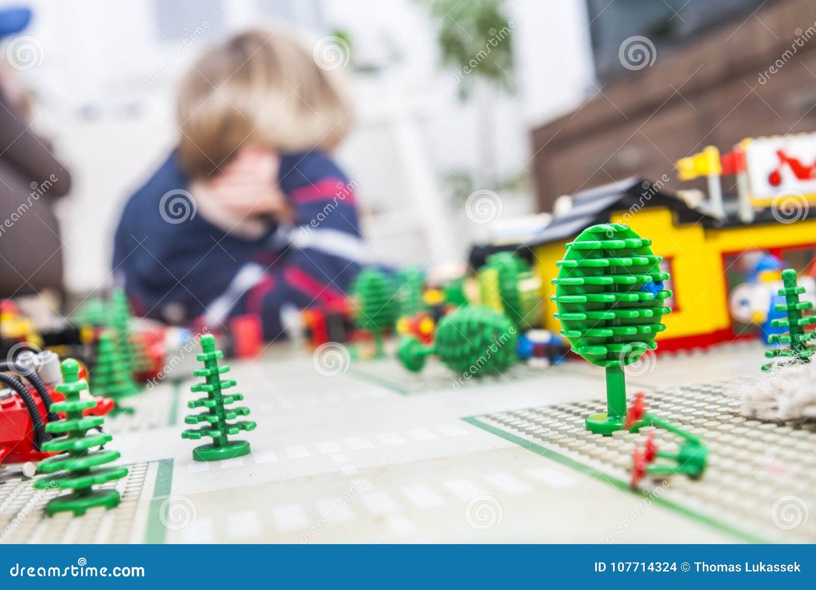 Little Boy Playing with Bricks on the Floor Stock Photo - Image of kids ...