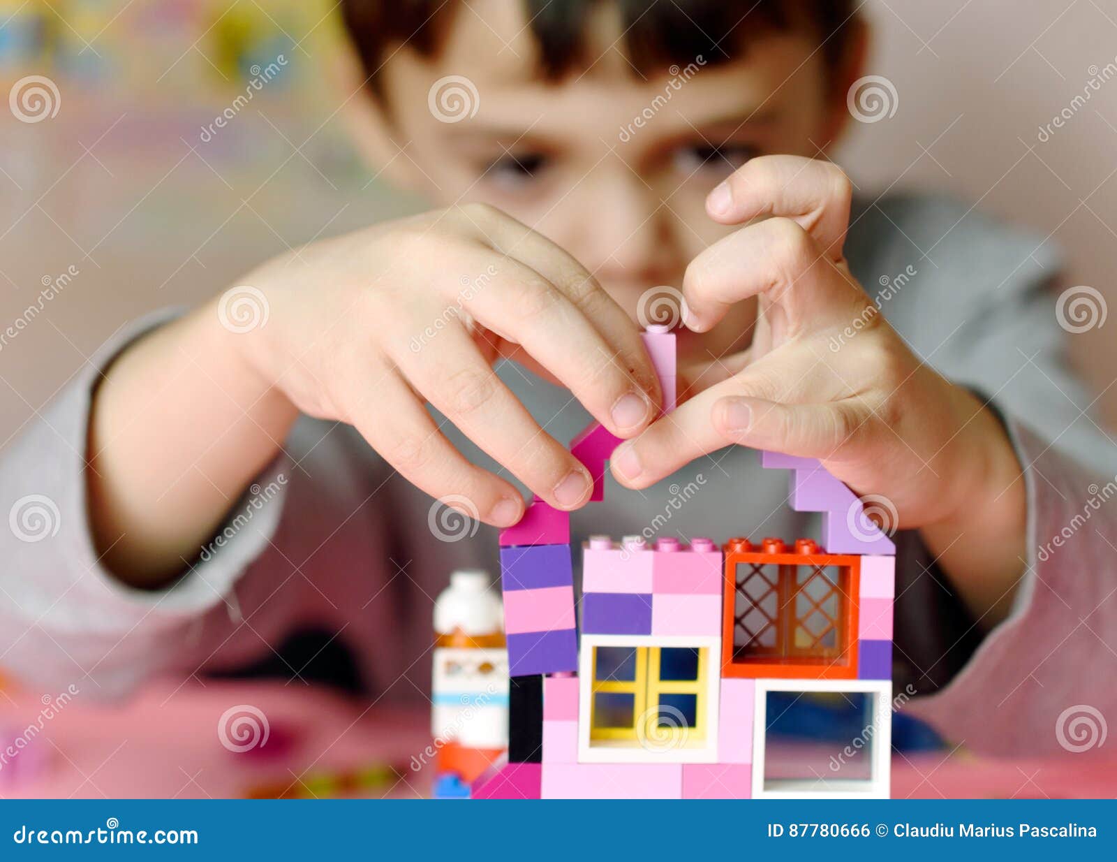 Little Boy Playing with Building Blocks Stock Photo - Image of young ...