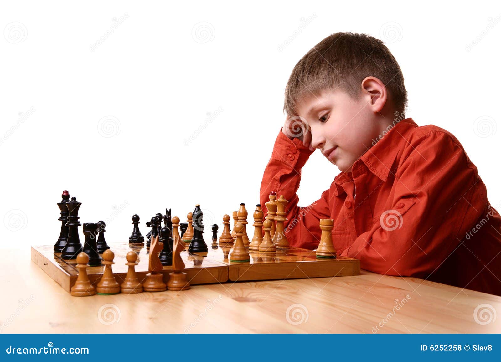 Little boy playing chess stock photo. Image of playing - 6252258