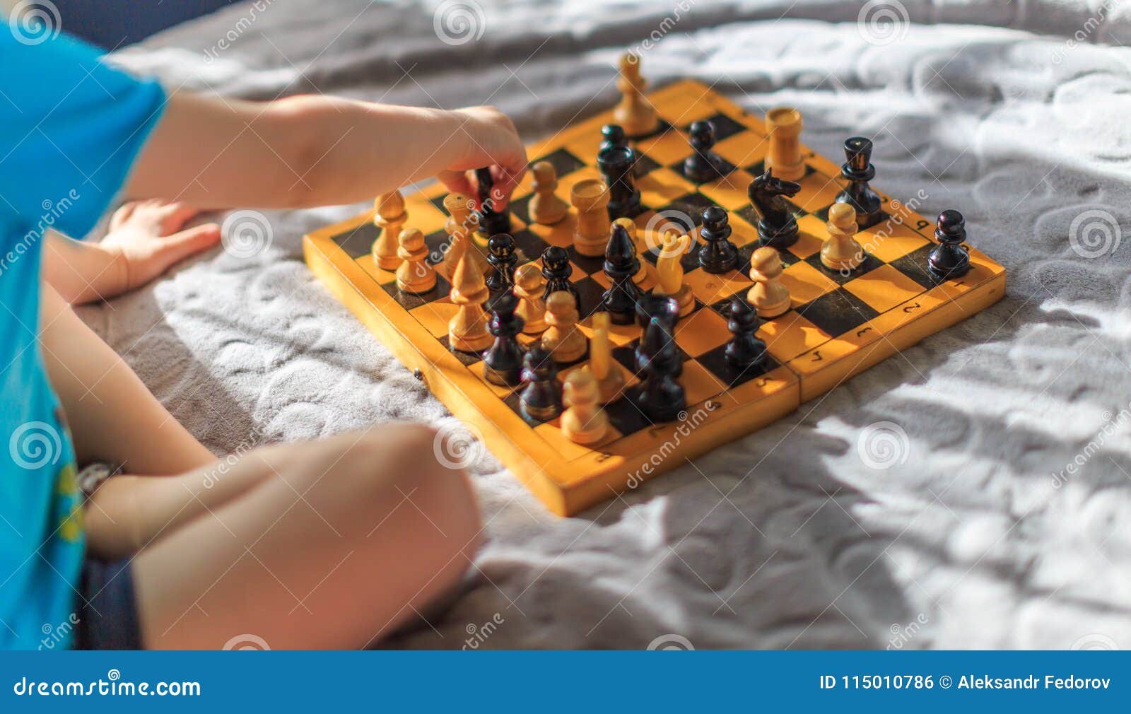 Little boy playing chess stock photo. Image of caucasian - 115010786