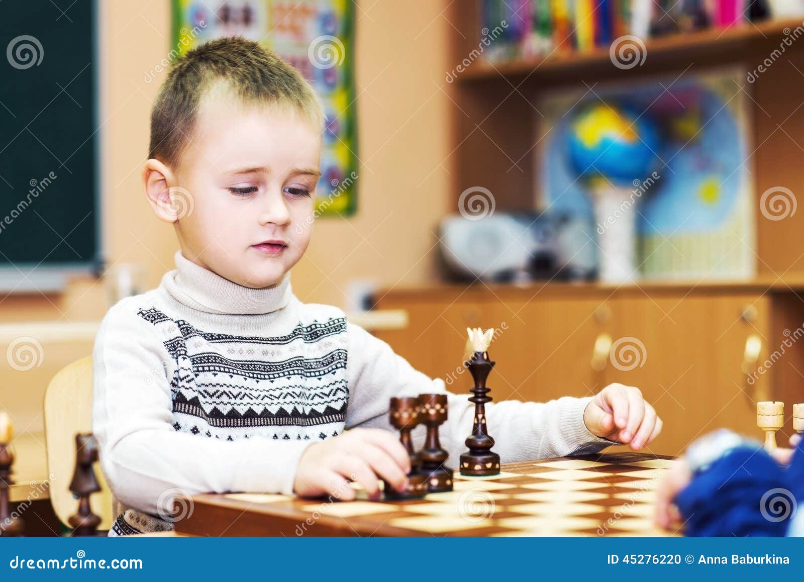 Little boy playing chess stock photo. Image of intelligent - 45276220