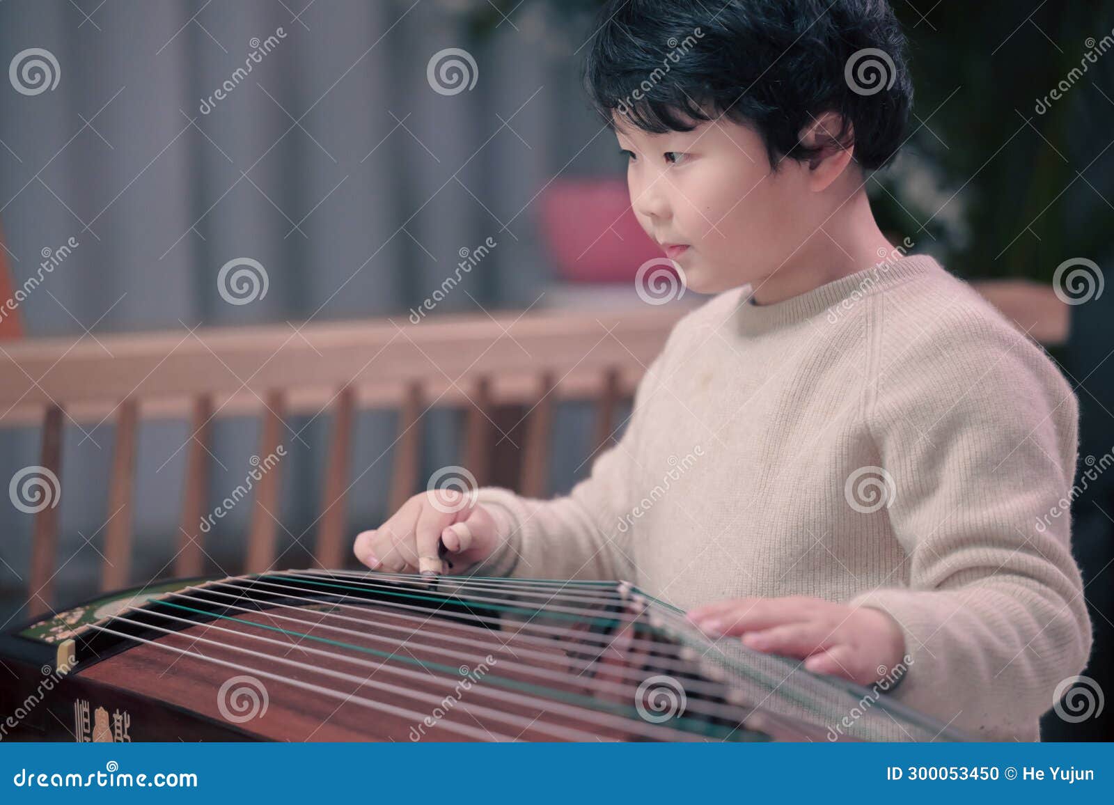 Little Boy Playing the Chinese Zither Stock Photo - Image of play ...