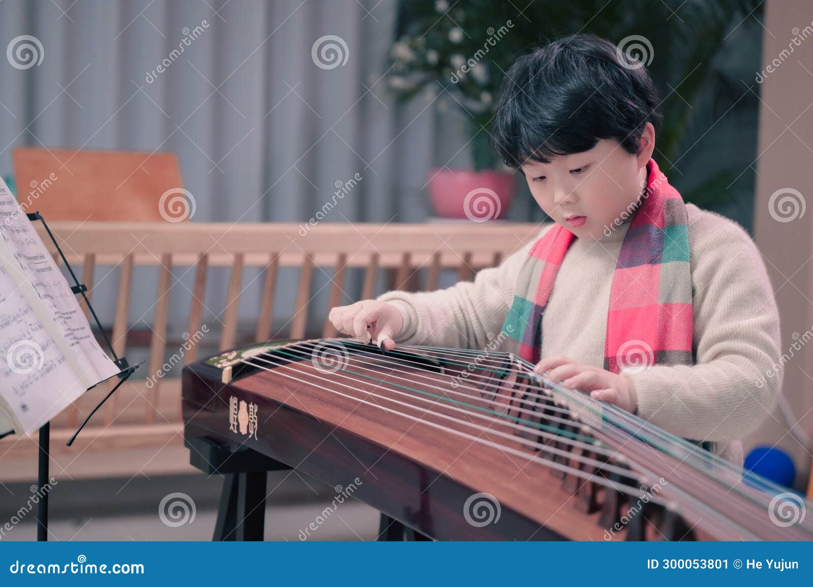 Little Boy Playing the Chinese Zither Stock Image - Image of suit ...