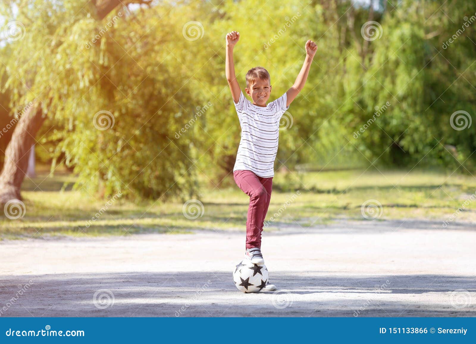 Little Boy Playing Football Outdoors Stock Photo - Image of caucasian ...
