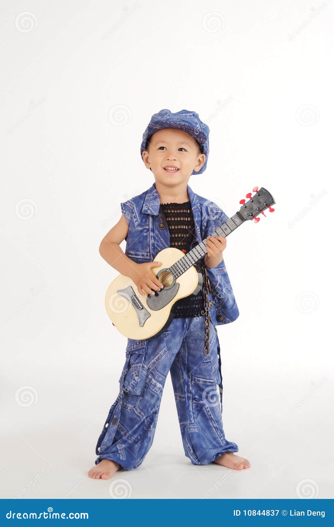 Little Boy is Playing Guitar Stock Image - Image of guitar, play: 10844837