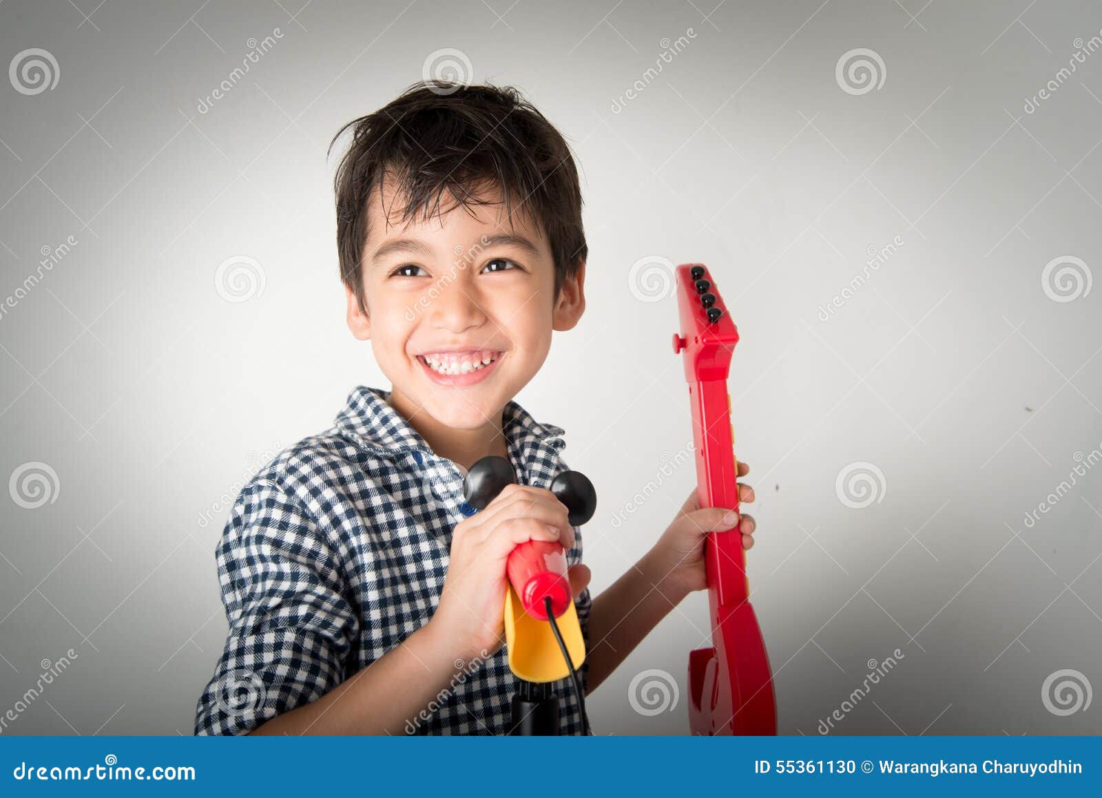 Little Boy Playing Guitar and Sing with Microphone Stock Photo - Image ...