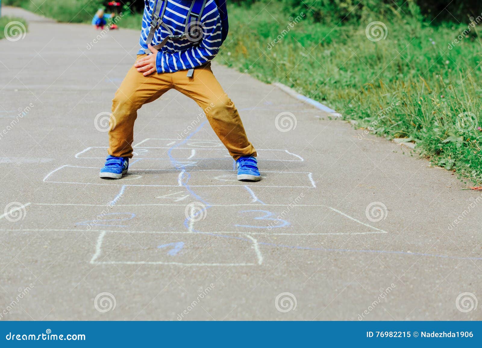 Little Boy Playing Hopscotch on Playground Stock Image - Image of urban ...