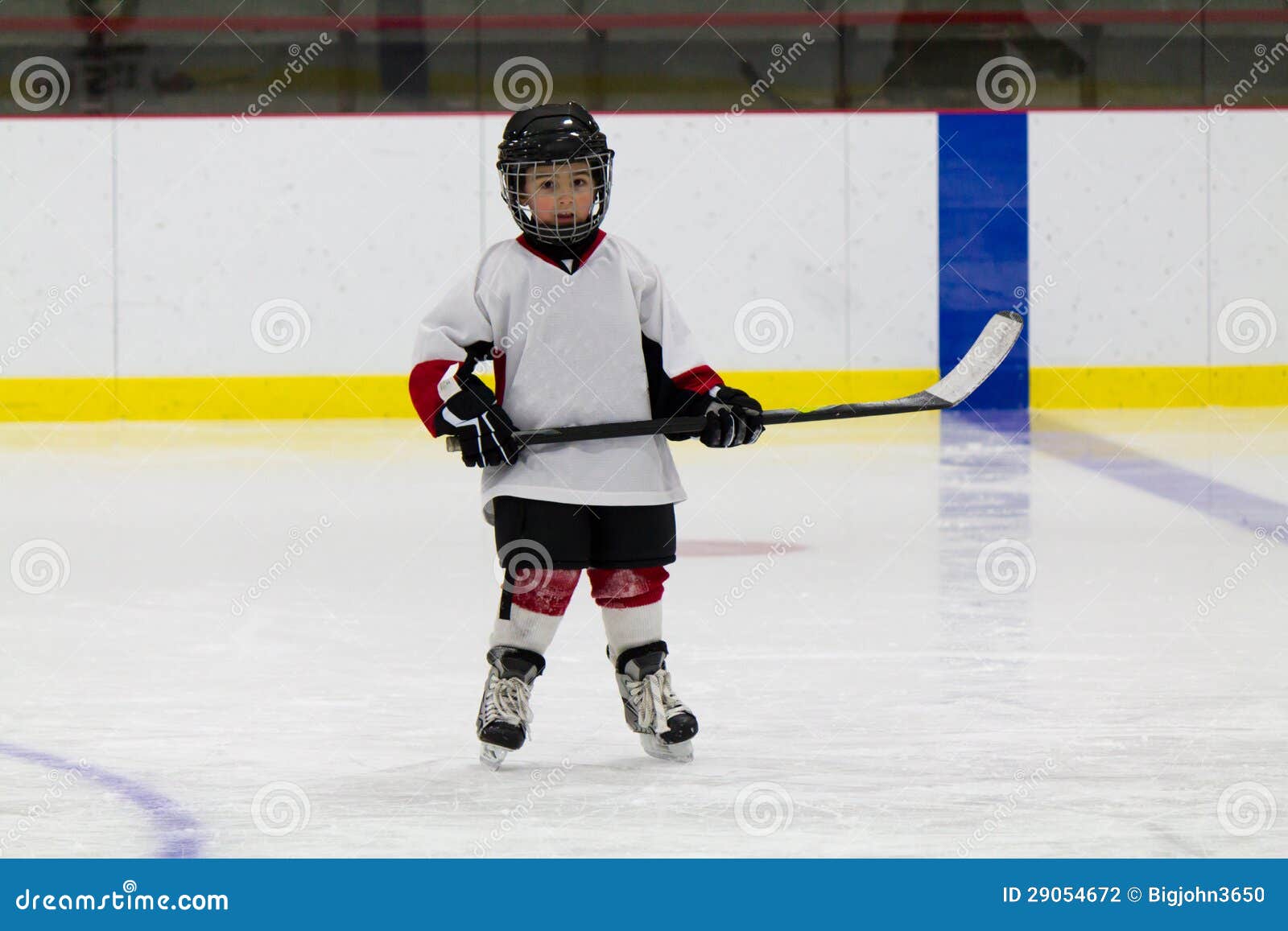 Little Boy Playing Ice Hockey Stock Photo - Image of games, people ...