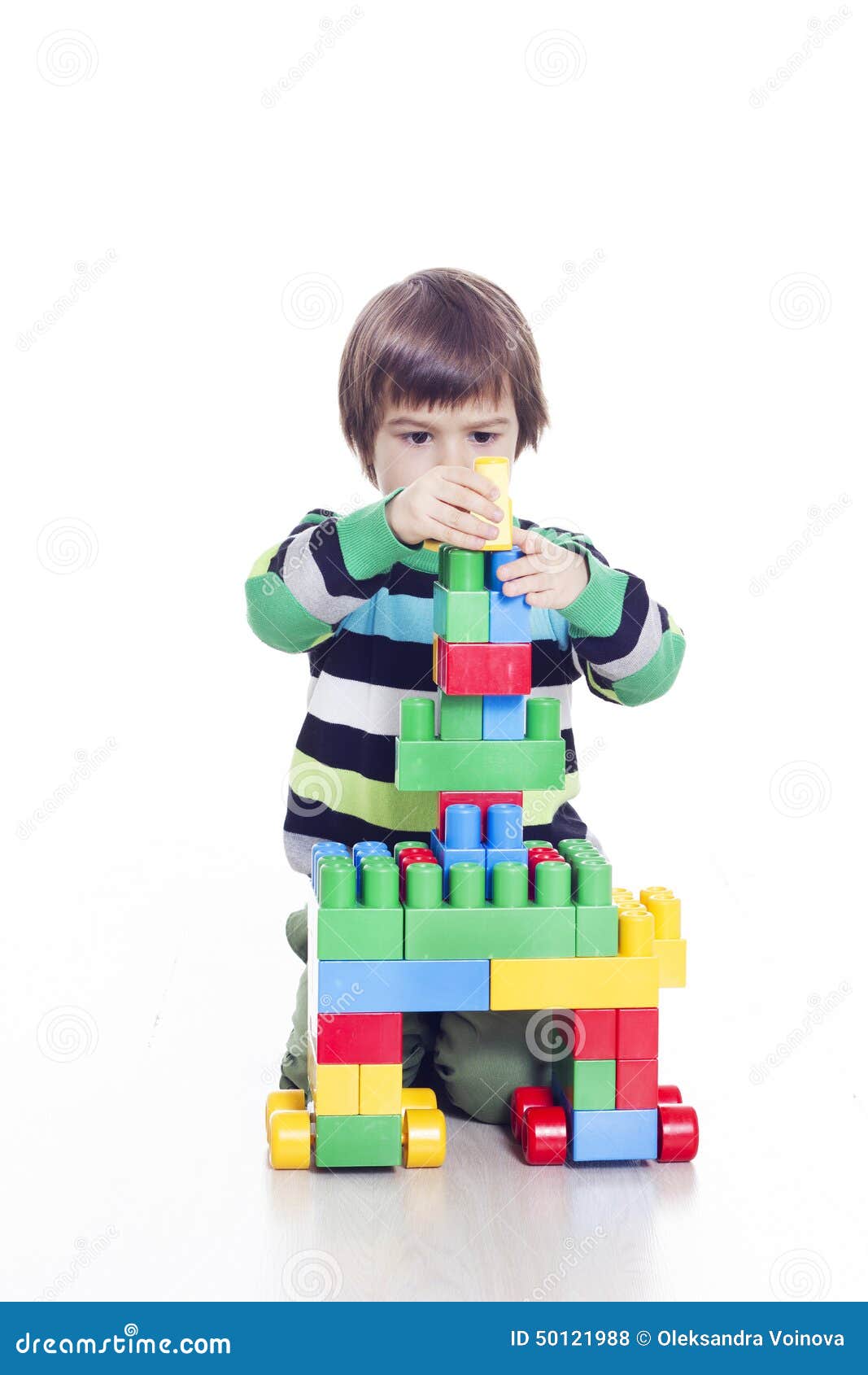 Little boy playing lego stock photo. Image of enjoyment - 50121988